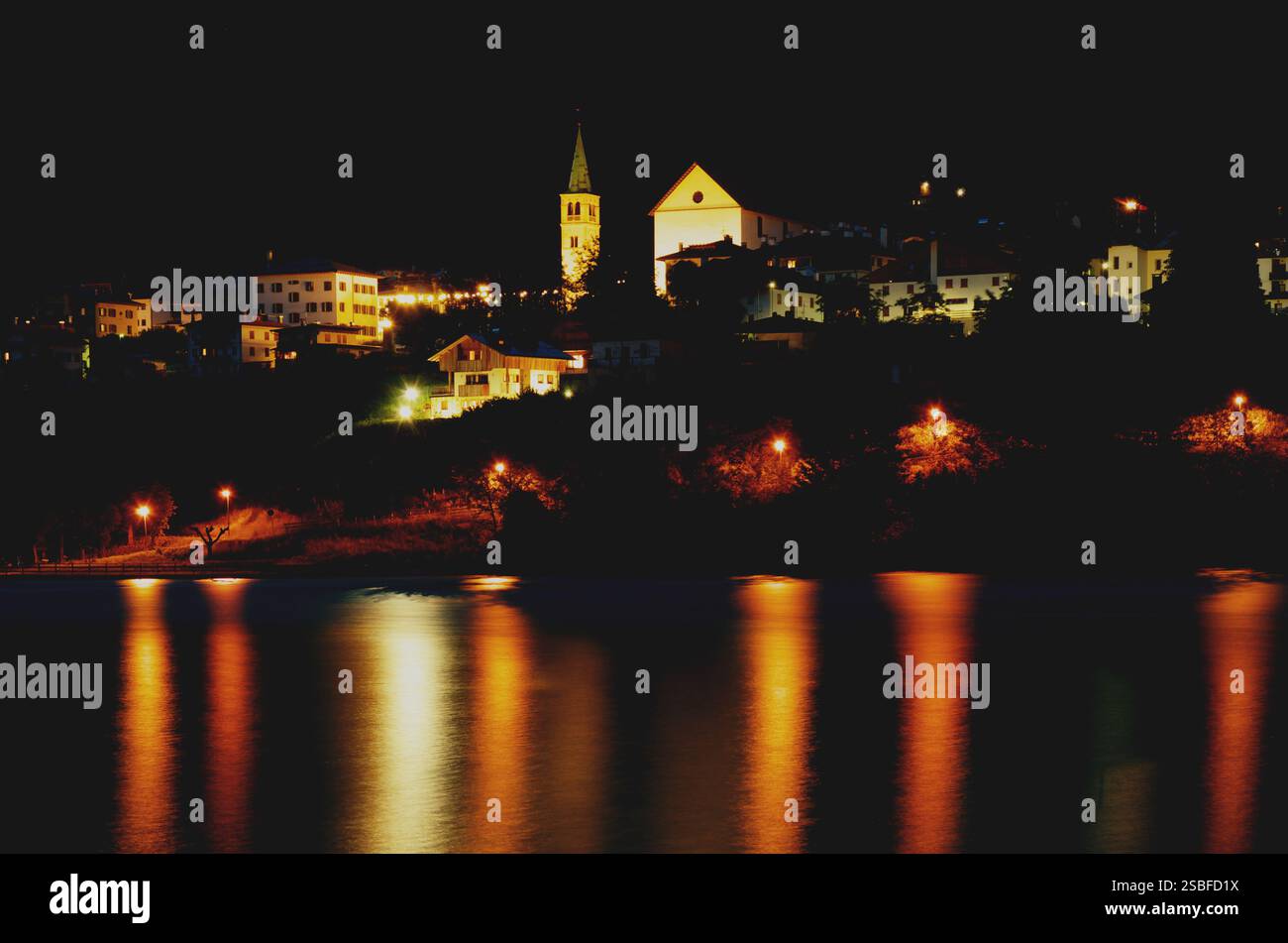 Nocturnal view of the Santa Caterina Lake in Auronzo di Cadore, Italy ...