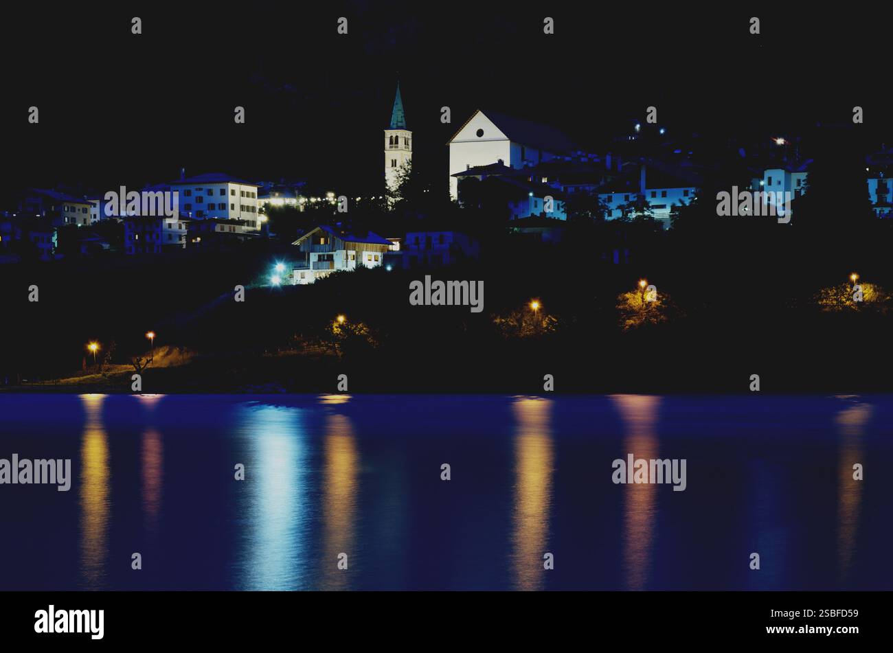 Nocturnal view of the Santa Caterina Lake in Auronzo di Cadore, Italy ...