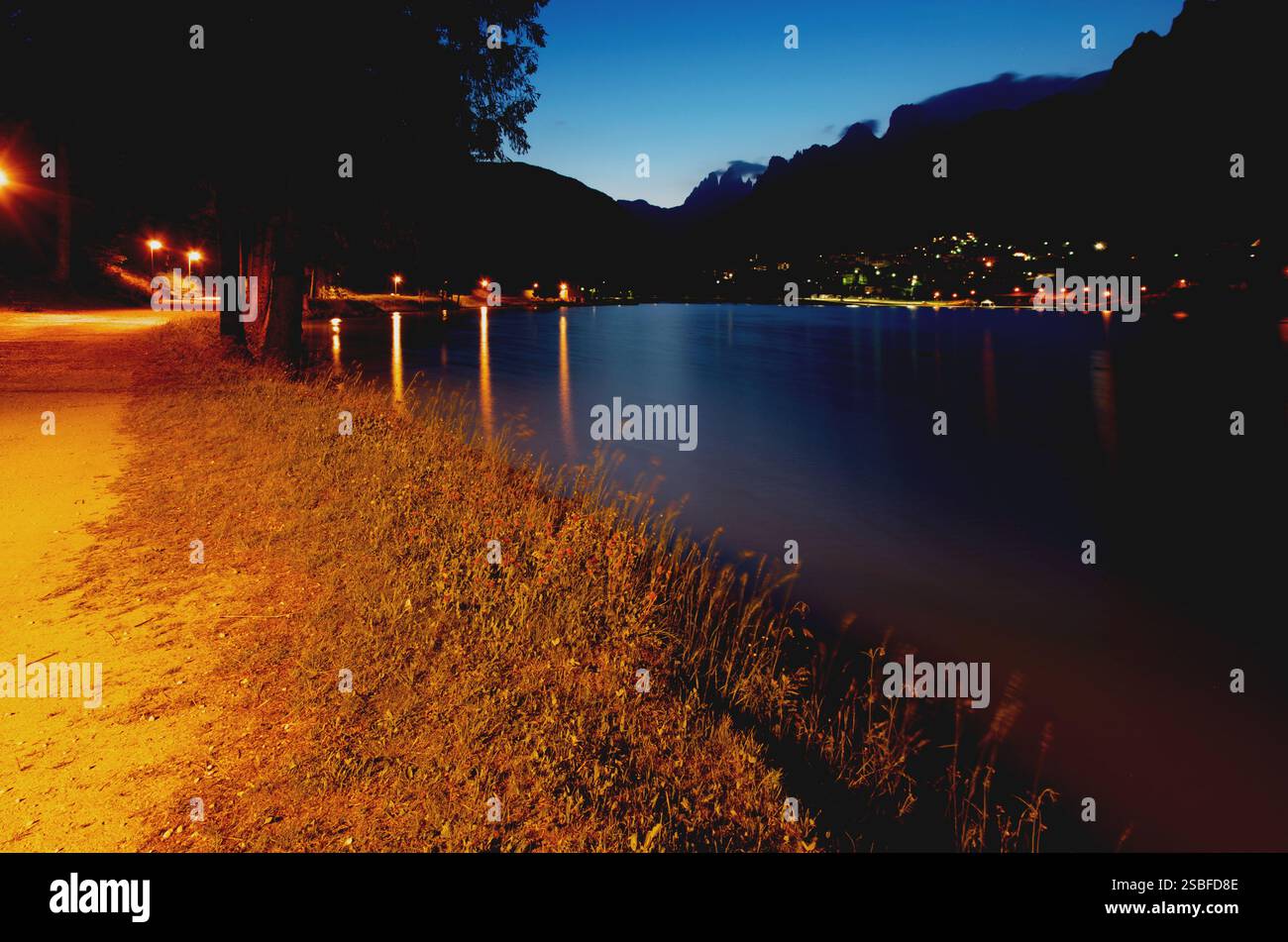 Nocturnal view of the Santa Caterina Lake in Auronzo di Cadore, Italy ...