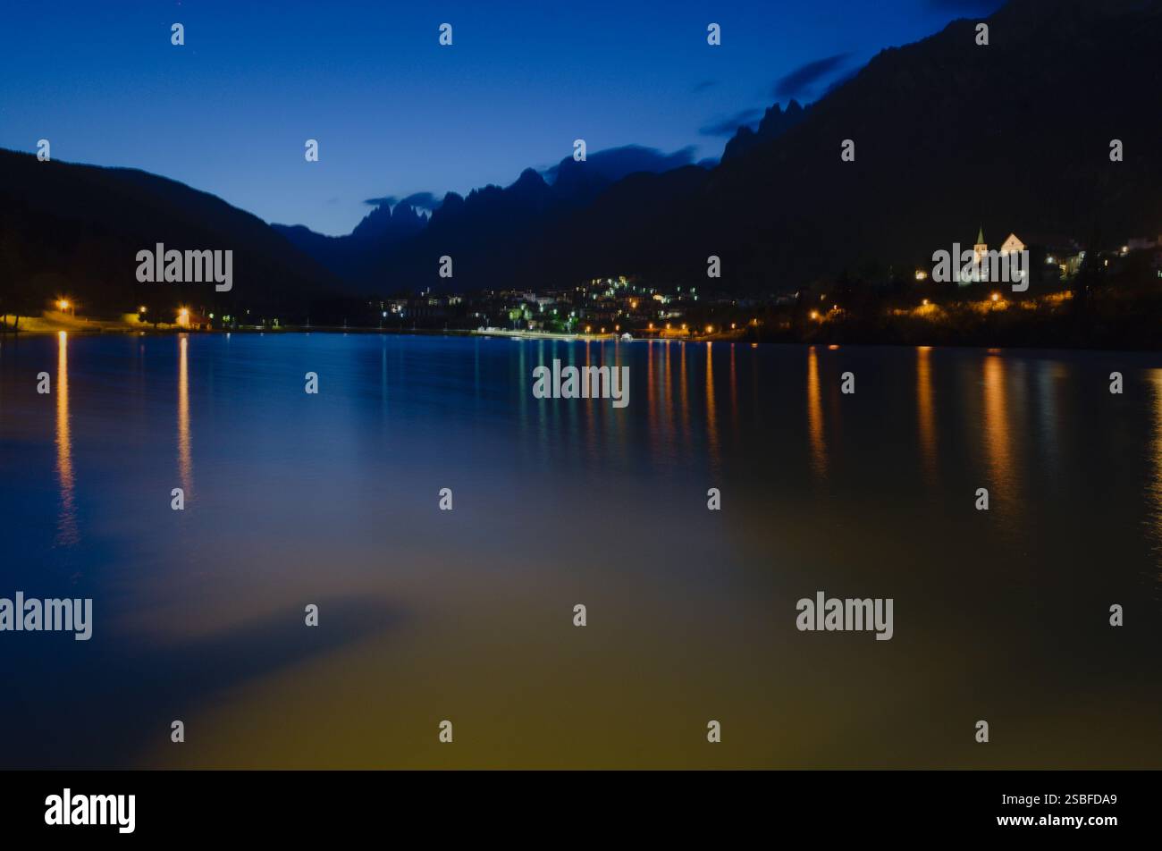 Nocturnal view of the Santa Caterina Lake in Auronzo di Cadore, Italy ...