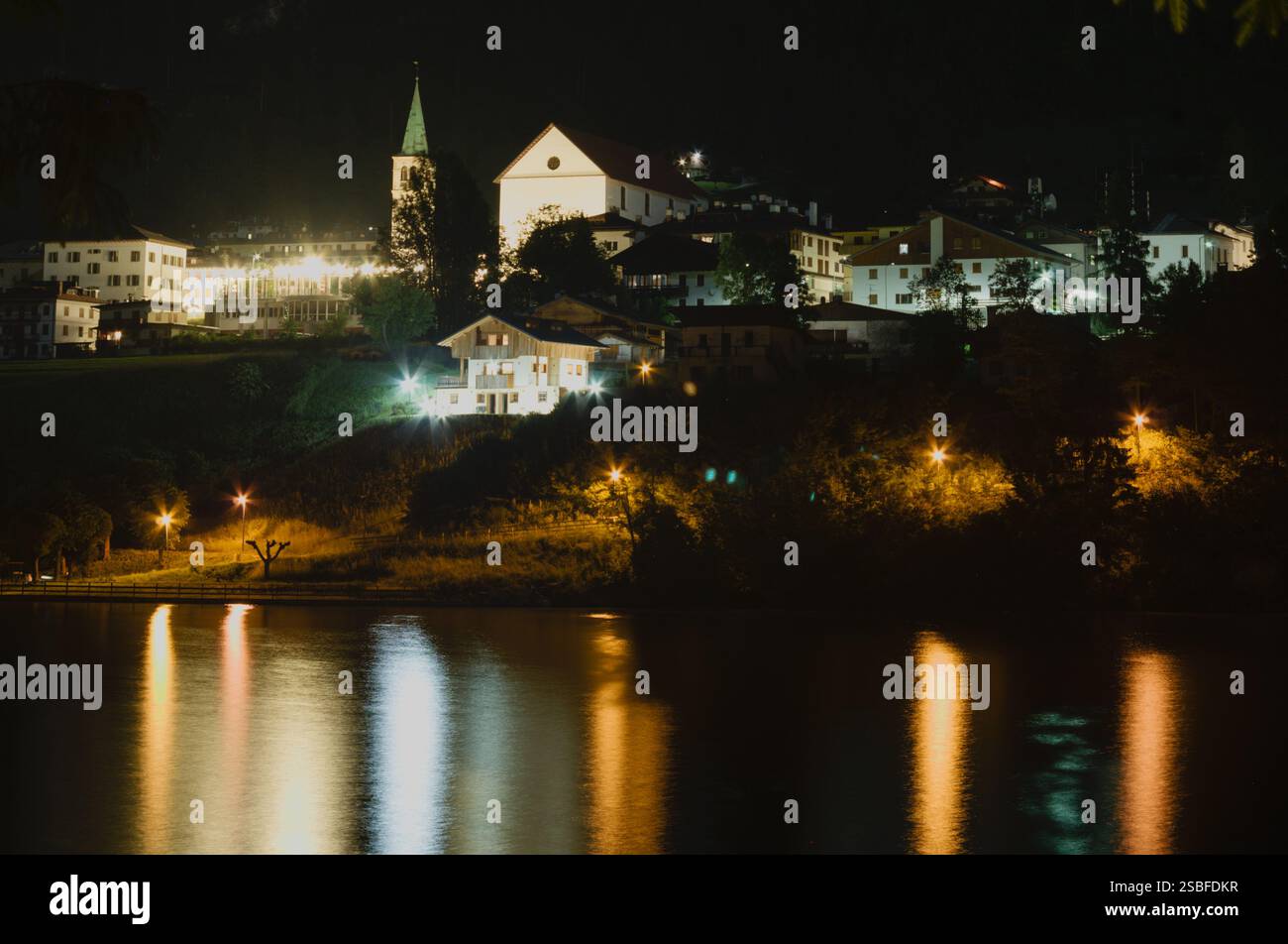 Nocturnal view of the Santa Caterina Lake in Auronzo di Cadore, Italy ...