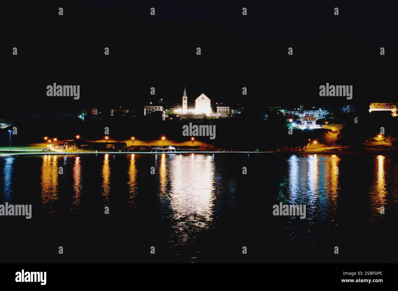 Nocturnal view of the Santa Caterina Lake in Auronzo di Cadore, Italy ...