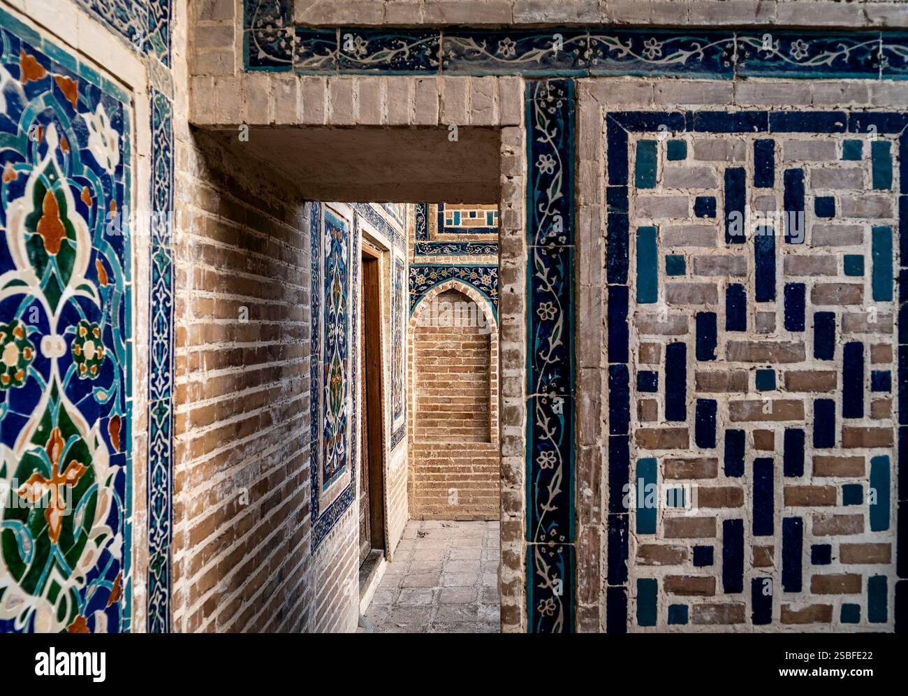 A view of intricate tile work and brick walls in a historical building ...