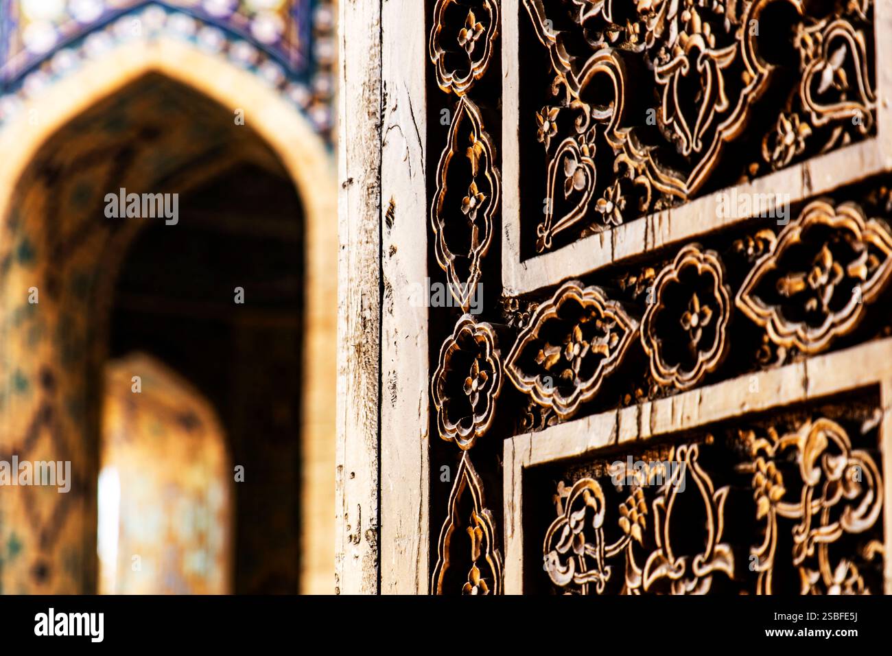 An intricate wooden door with ornate carvings, showcasing traditional ...