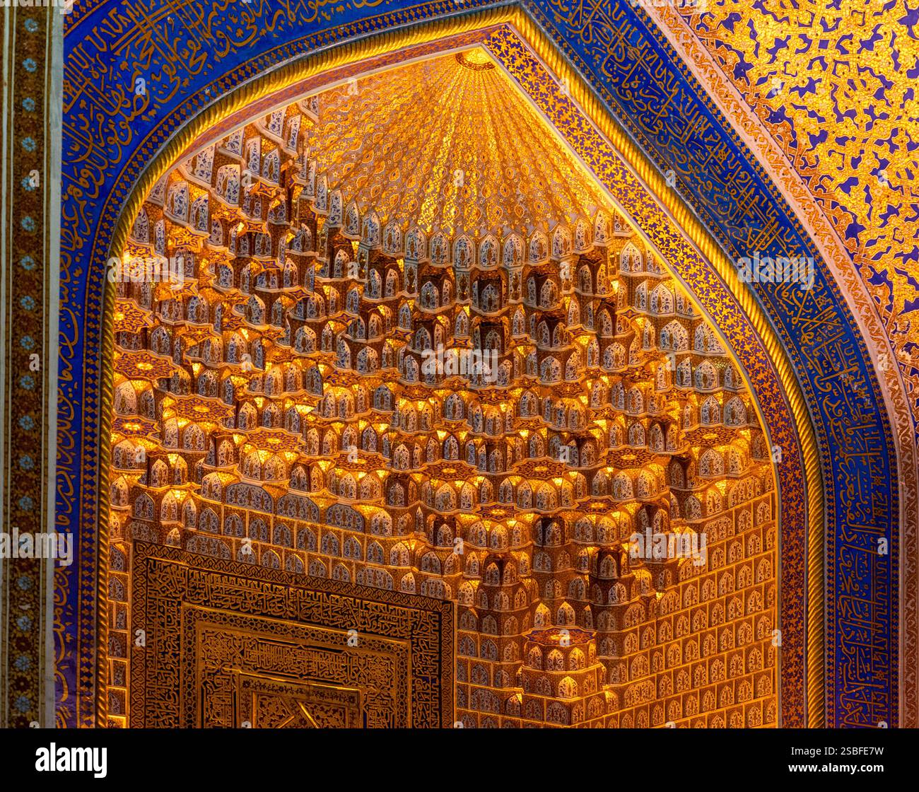 An intricate ceiling design featuring golden patterns and geometric ...