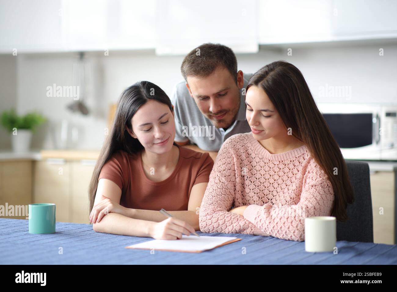 Signing house rental contract hi-res stock photography and images - Alamy