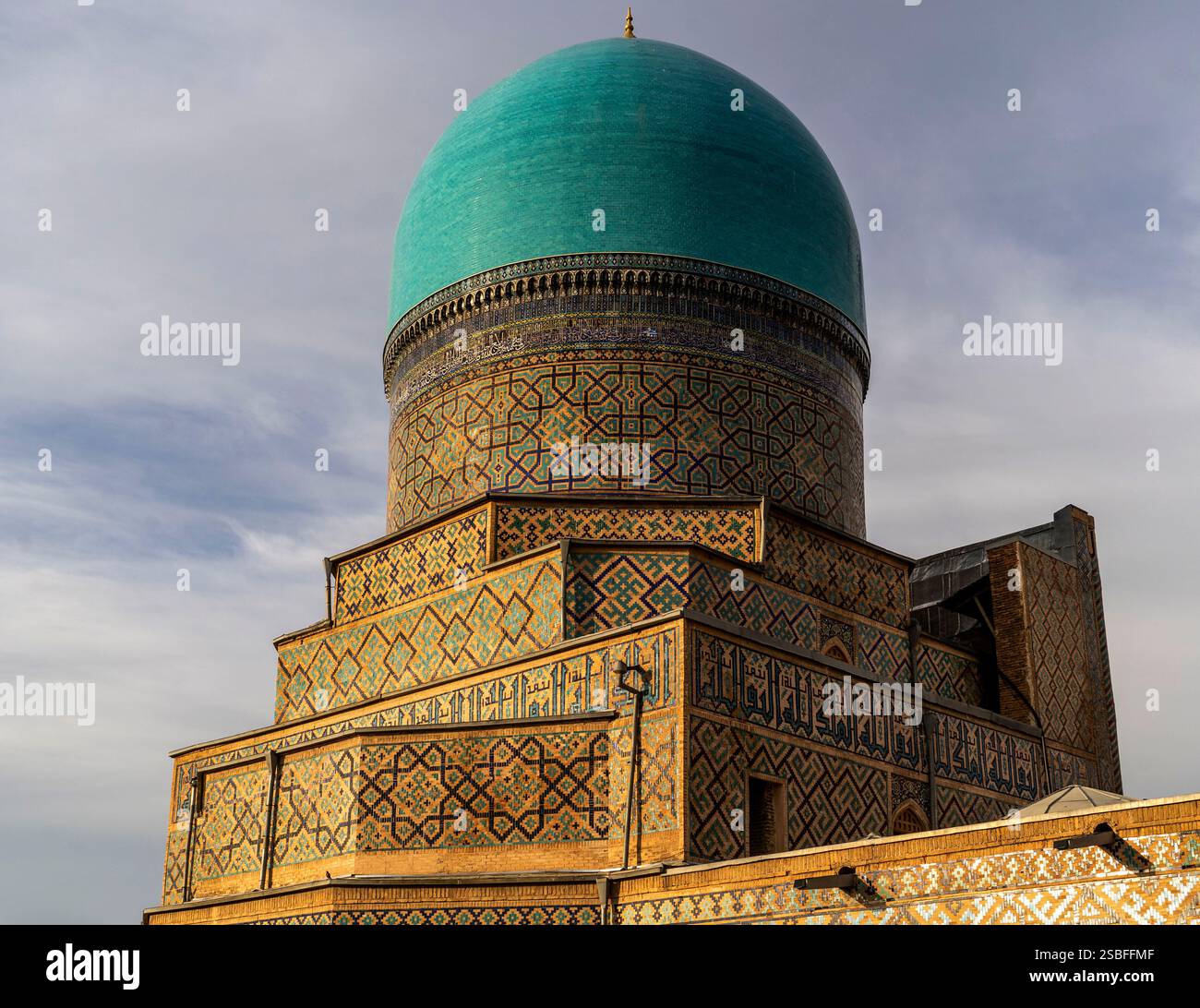 A close-up view of a historic building featuring intricate tile work ...