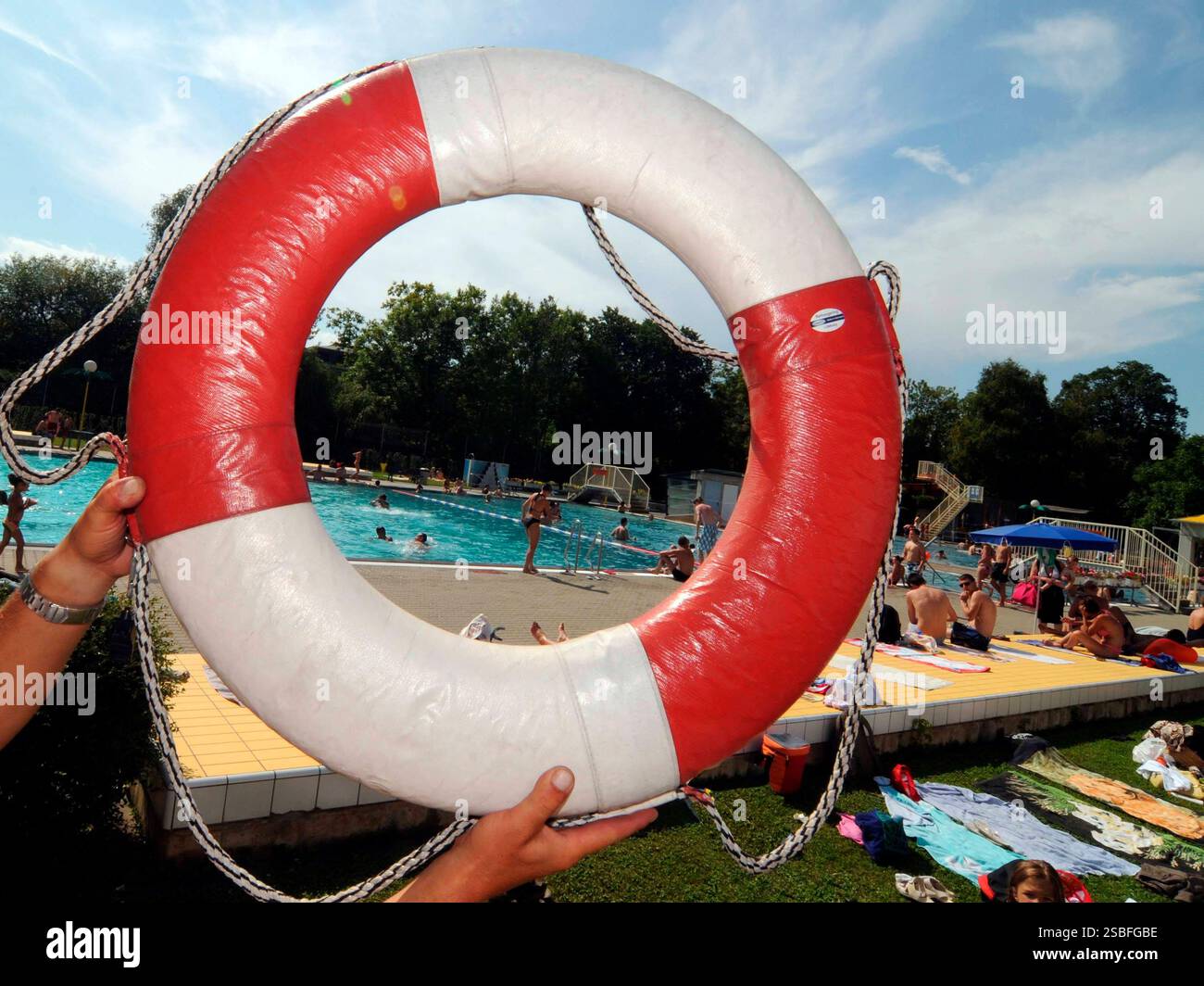 life belt with warning sign on risks and hazards in seafaring and ...