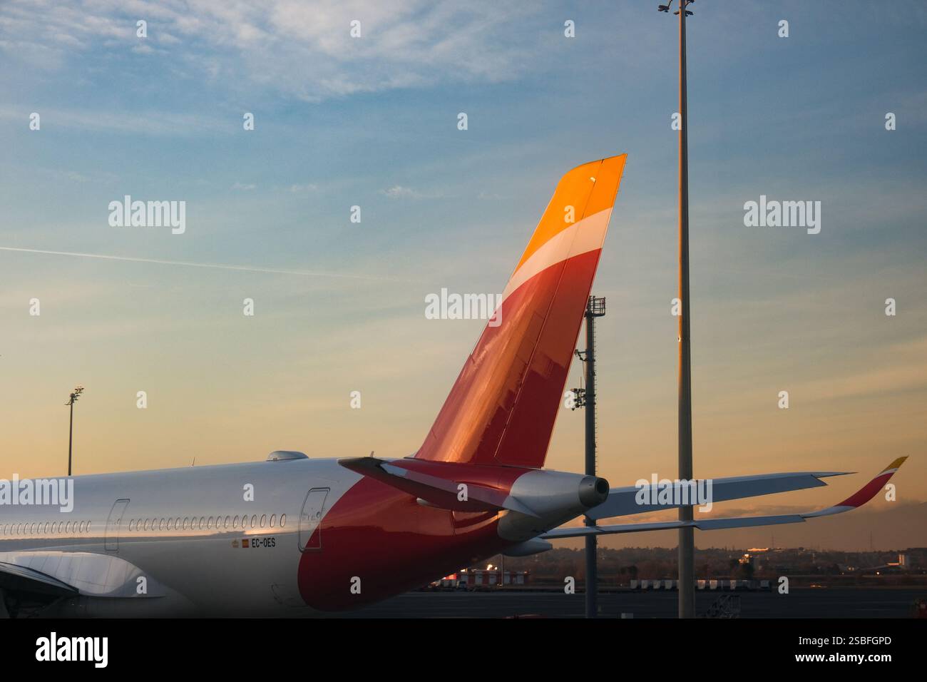 Madrid, Spain. 12 22 2024: Detail of the tail of a passenger plane. It ...