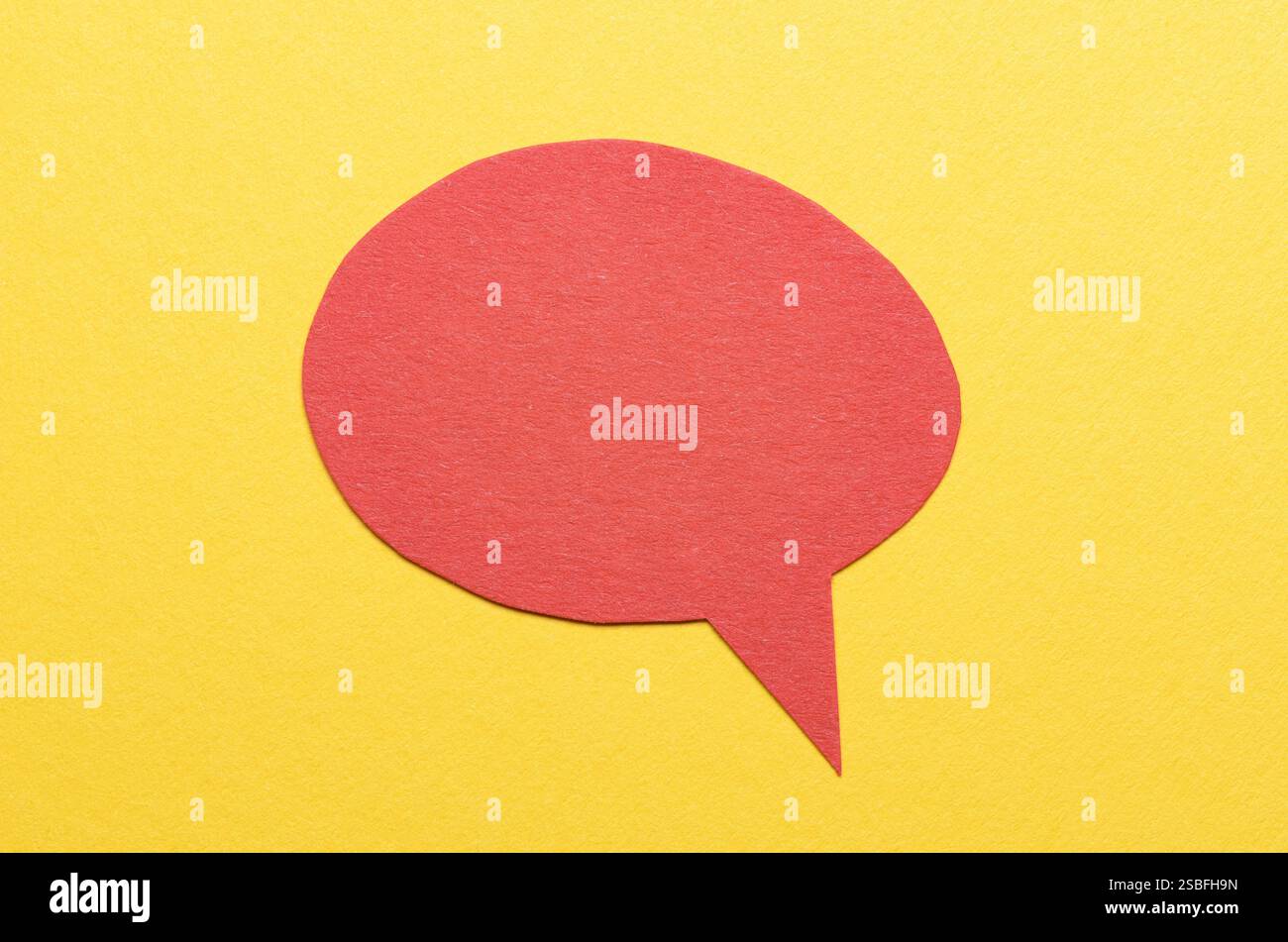 Red cut out blank paper speech bubble of round shape with copy space ...
