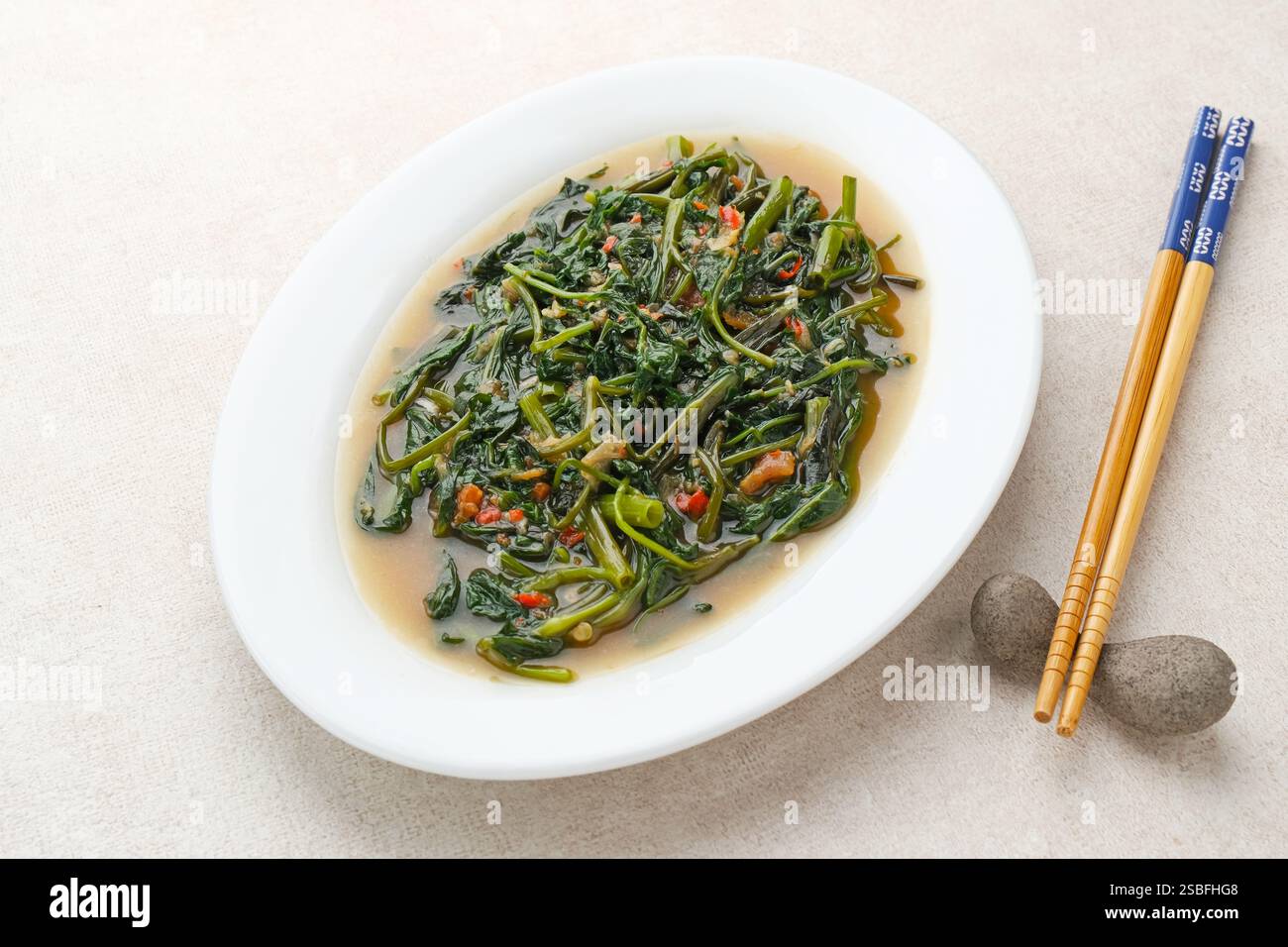 Ca Kangkung Belacan or Stir fried water spinach, Indonesian food Stock ...