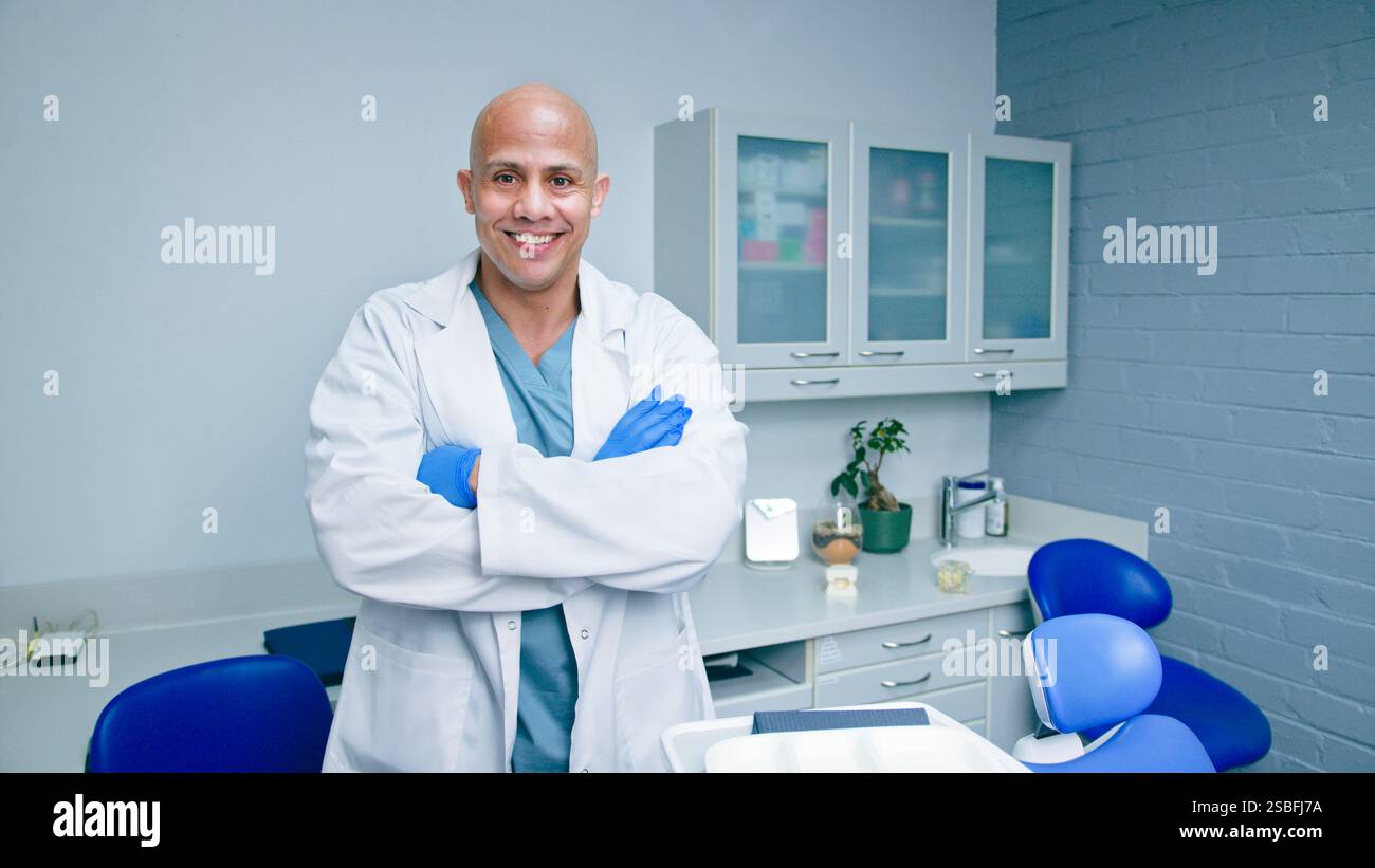 Smiling Dentist Standing Confidently in a Modern Dental Office with ...