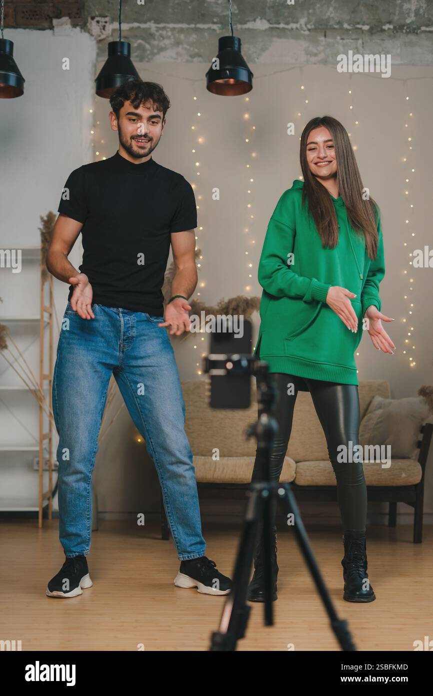 A talented dance duo showcases their skills in a studio for creative ...