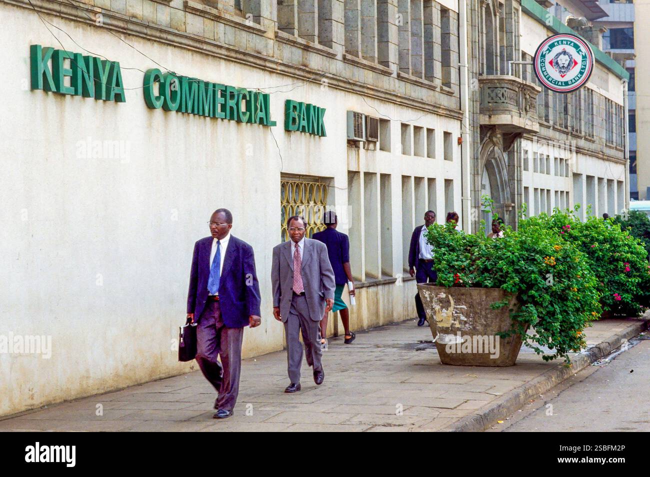 Kenya, Nairobi. Office workers leave the Kenia Commercial Bank Stock ...