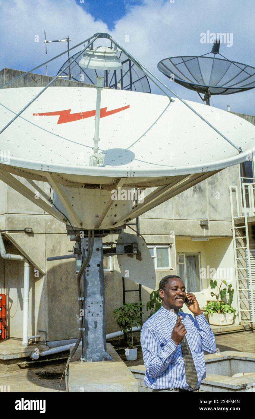 Kenya, Nairobi, an employee of the internet company Kenya Web uses his ...