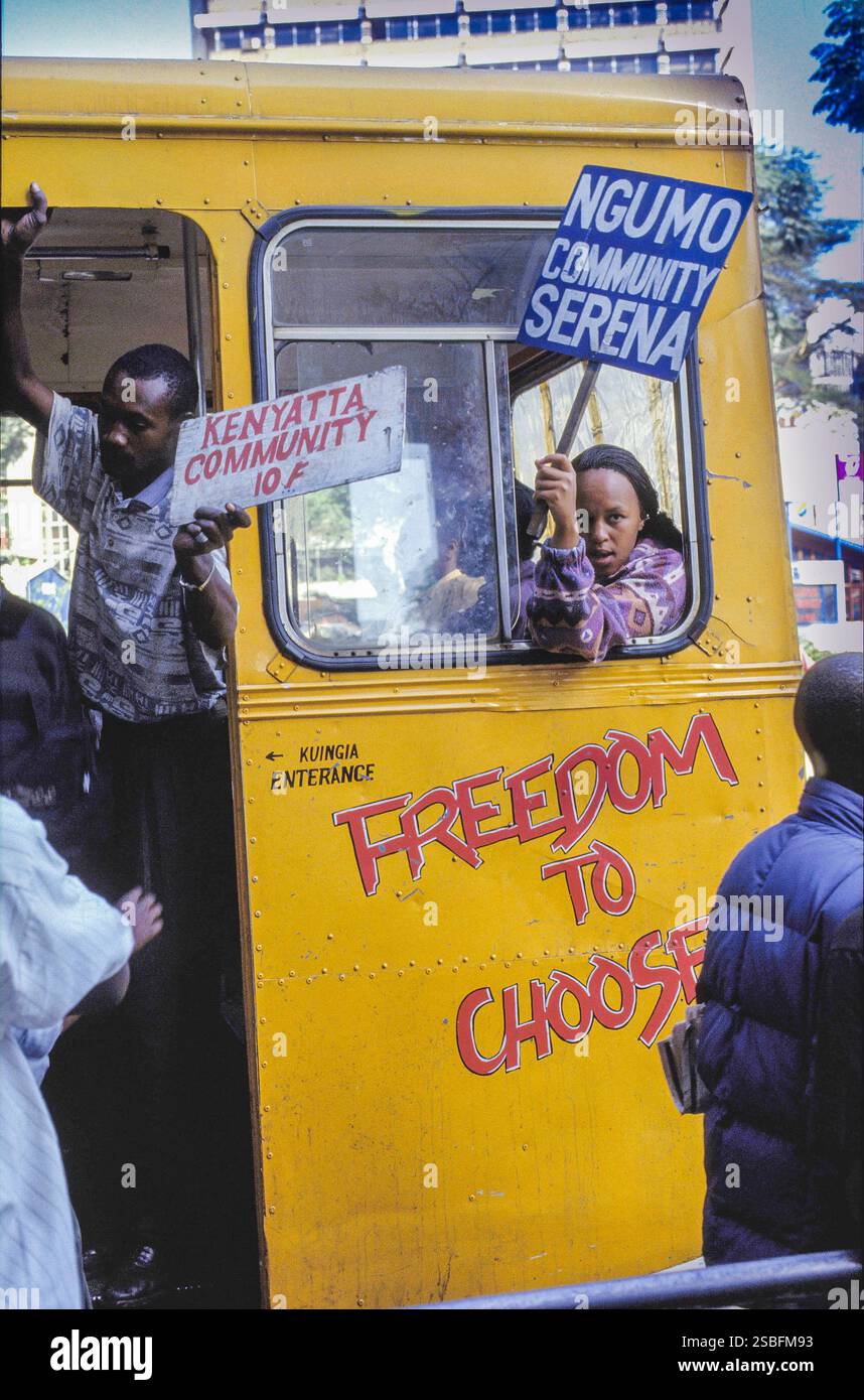 Kenia, Nairobi ,man and a woman are showing the direction where the bus ...