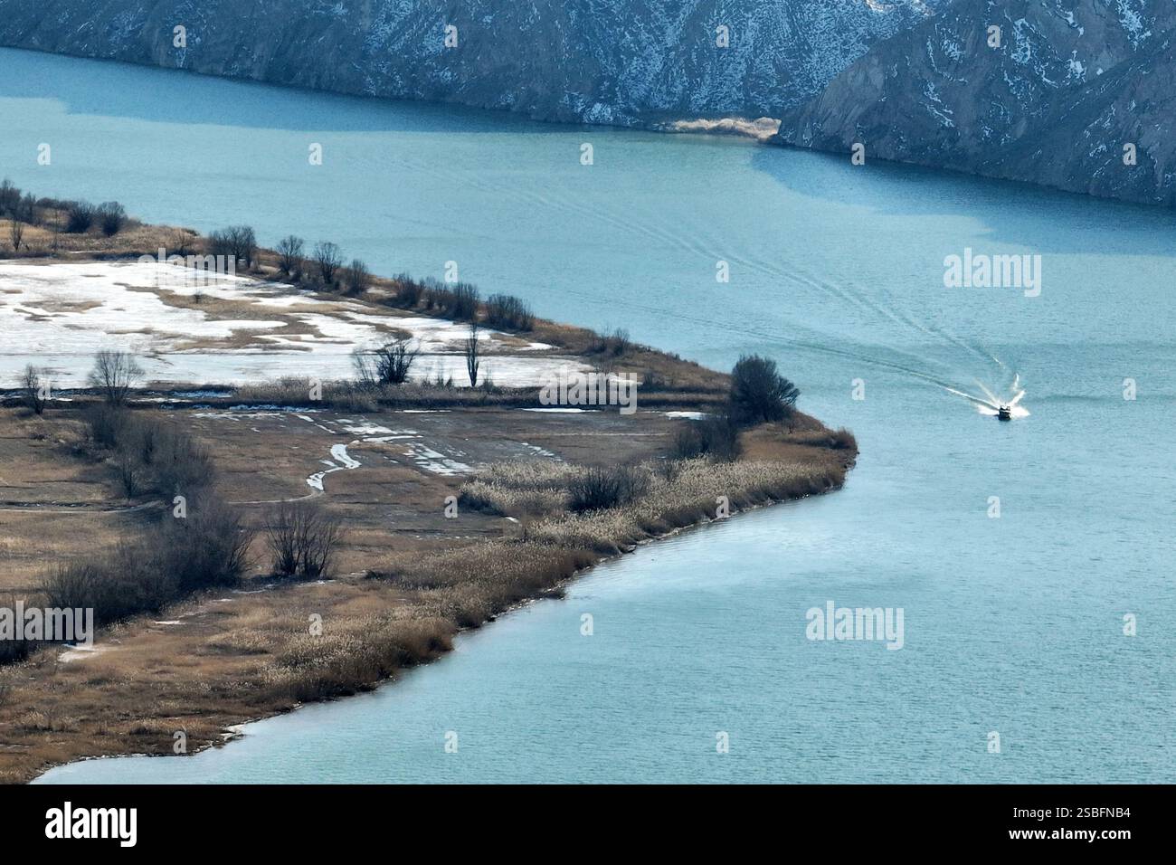 WUZHONG, CHINA - FEBRUARY 3, 2025 - Tourists take boats to visit the ...