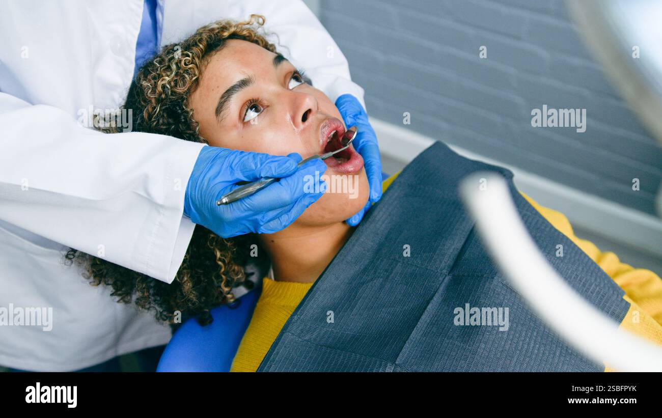 Patient Receiving Professional Dental Examination in Dental Clinic ...