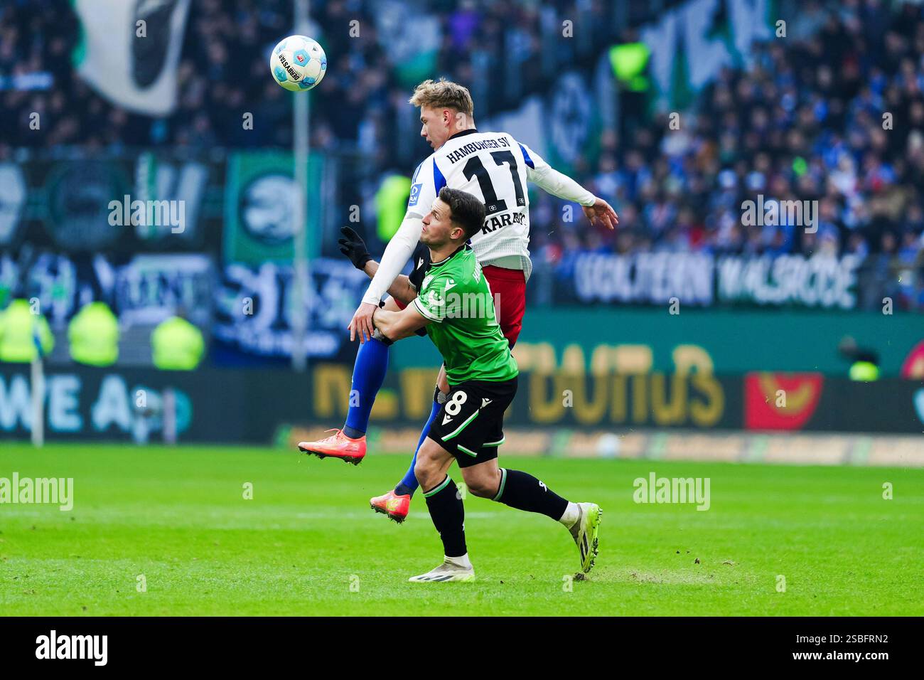 Hamburg, Deutschland. 02nd Feb, 2025. Adam Karabec (Hamburger SV, #17), Enzo Leopold (Hannover ...
