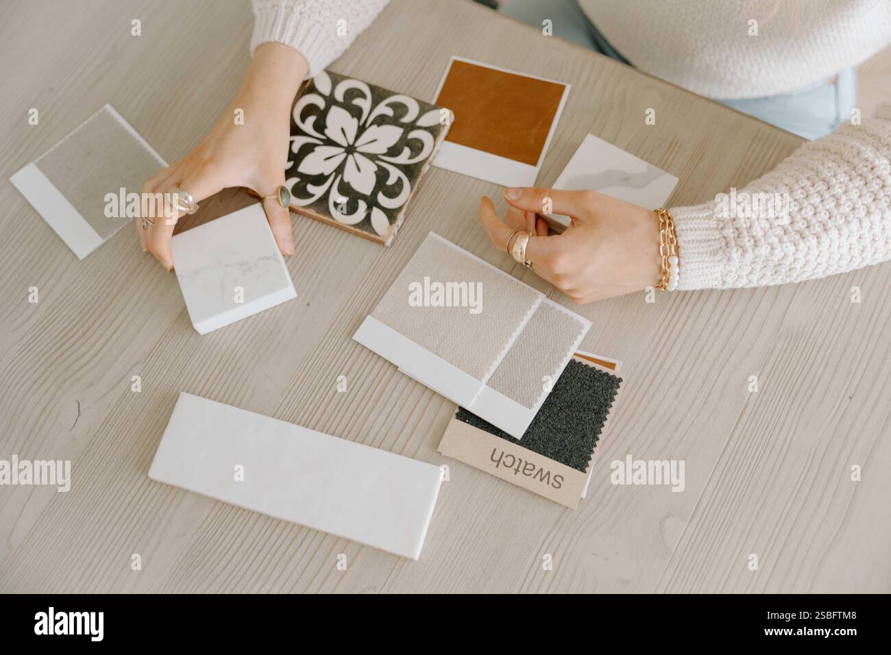 Interior designer selecting materials for design Stock Photo - Alamy