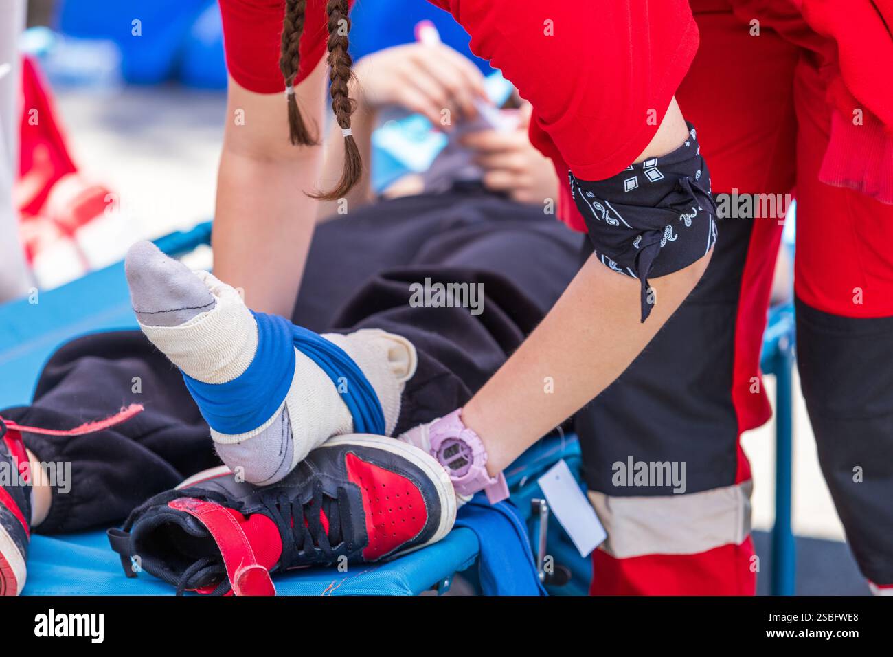 Foot or leg injury, first aid after accident Stock Photo - Alamy