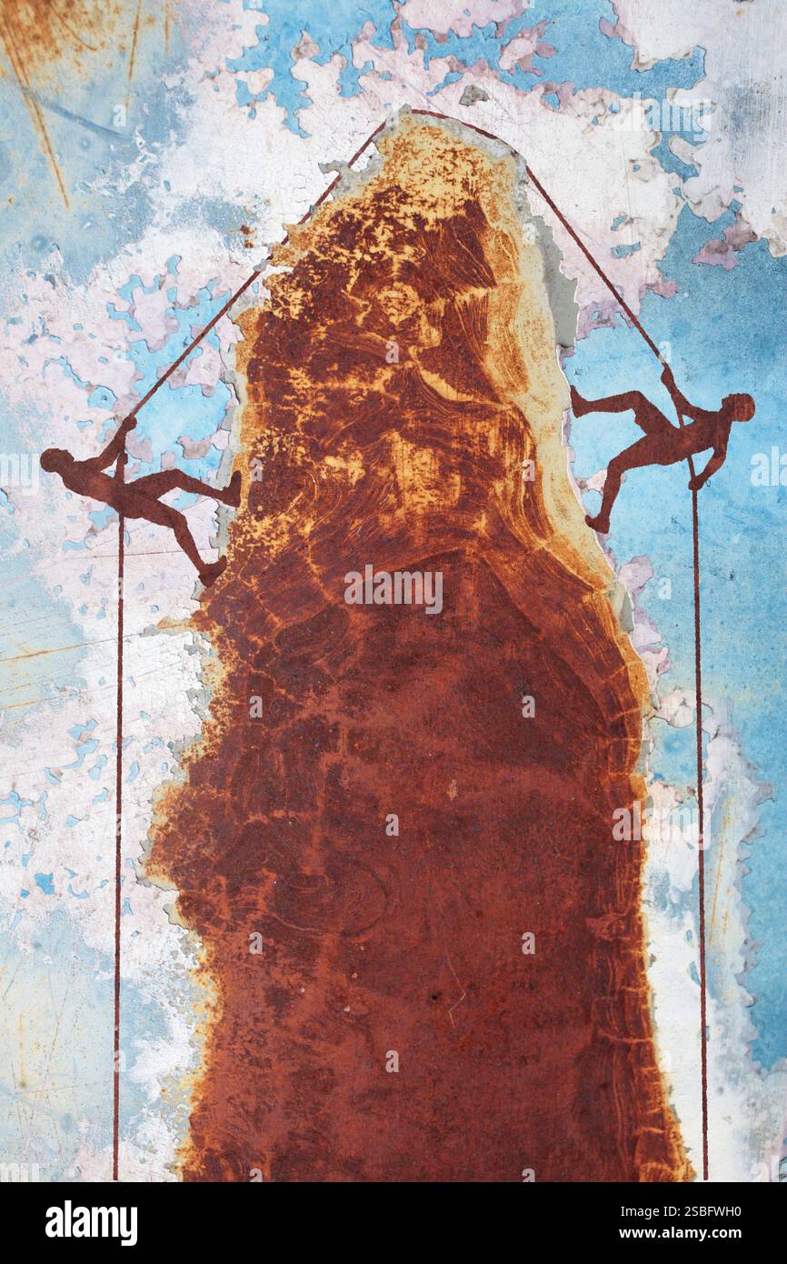 Two climbers using same rope to climb different sides Stock Photo - Alamy