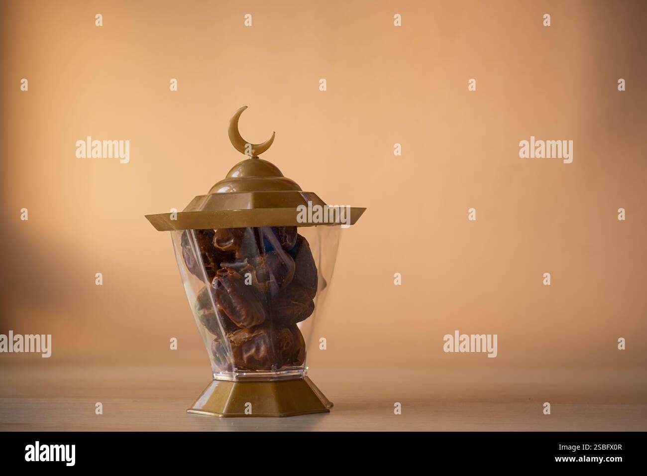 Ramadan Dates in Traditional Crescent-Topped Container Stock Photo - Alamy