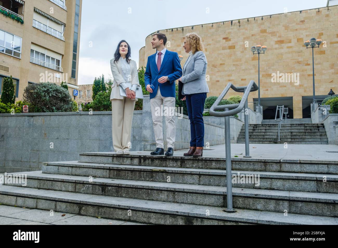 Politicians discussing city issues on courthouse steps Stock Photo - Alamy