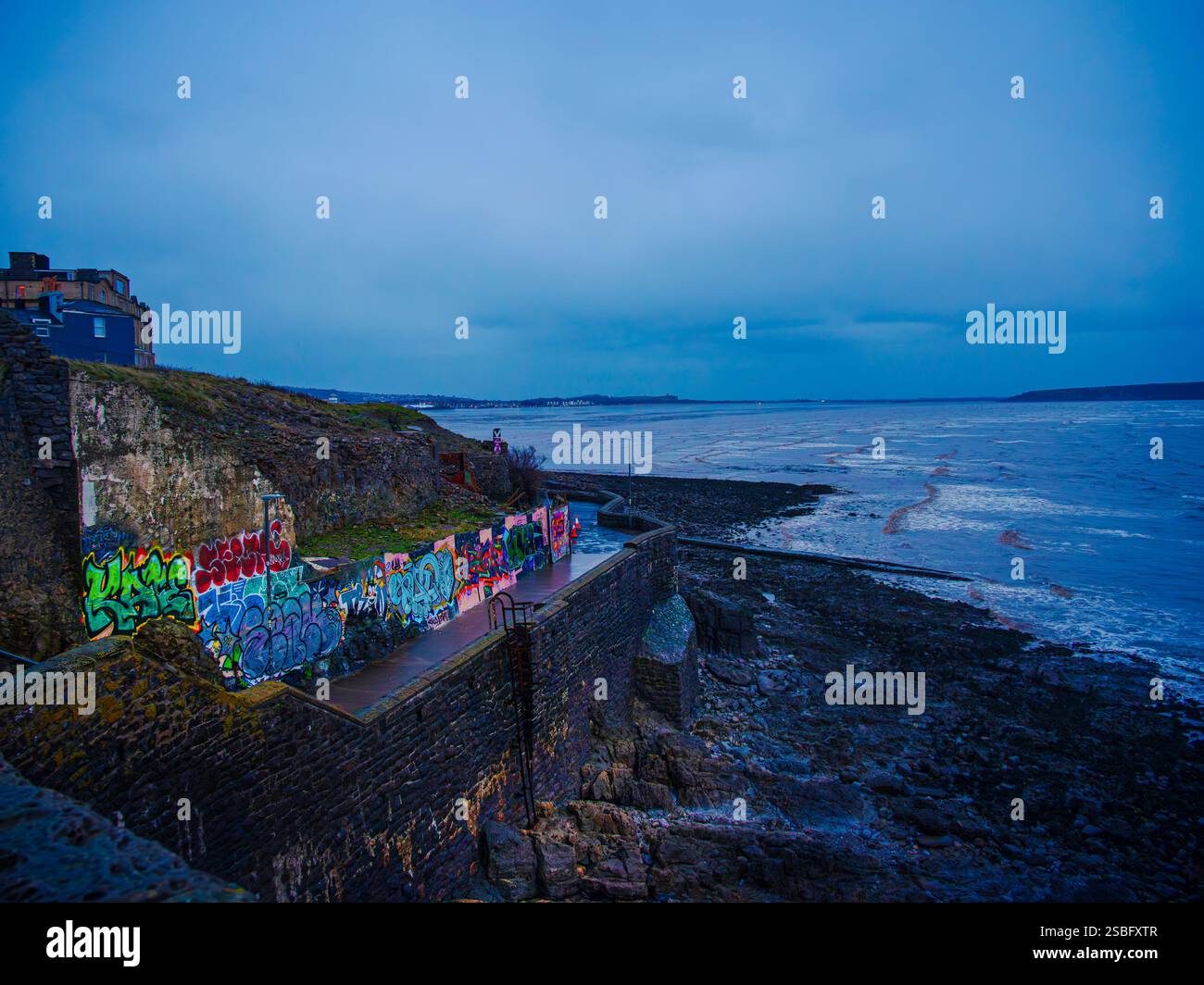 Graffiti on the seafront of Weston-Super-Mare during a winter storm ...