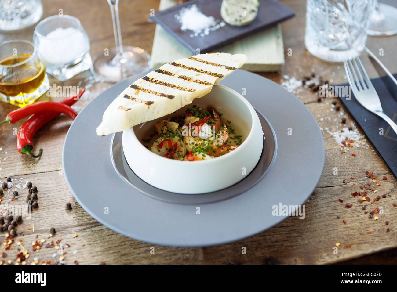 Shrimp pil-pil. King prawns, garlic, chilli and baguette. Delicious ...