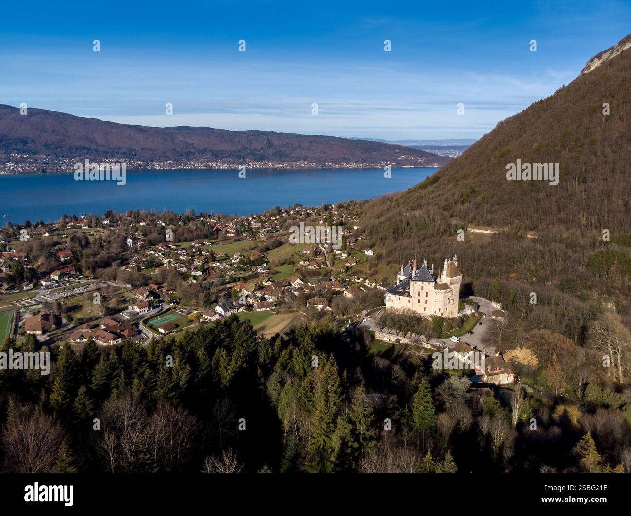 Landscape with the medieval castle and the village of Menthon-Saint ...