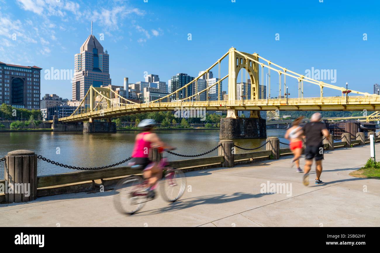 Lively scene in Pittsburgh, Pennsylvania, with downtown skyline in the ...