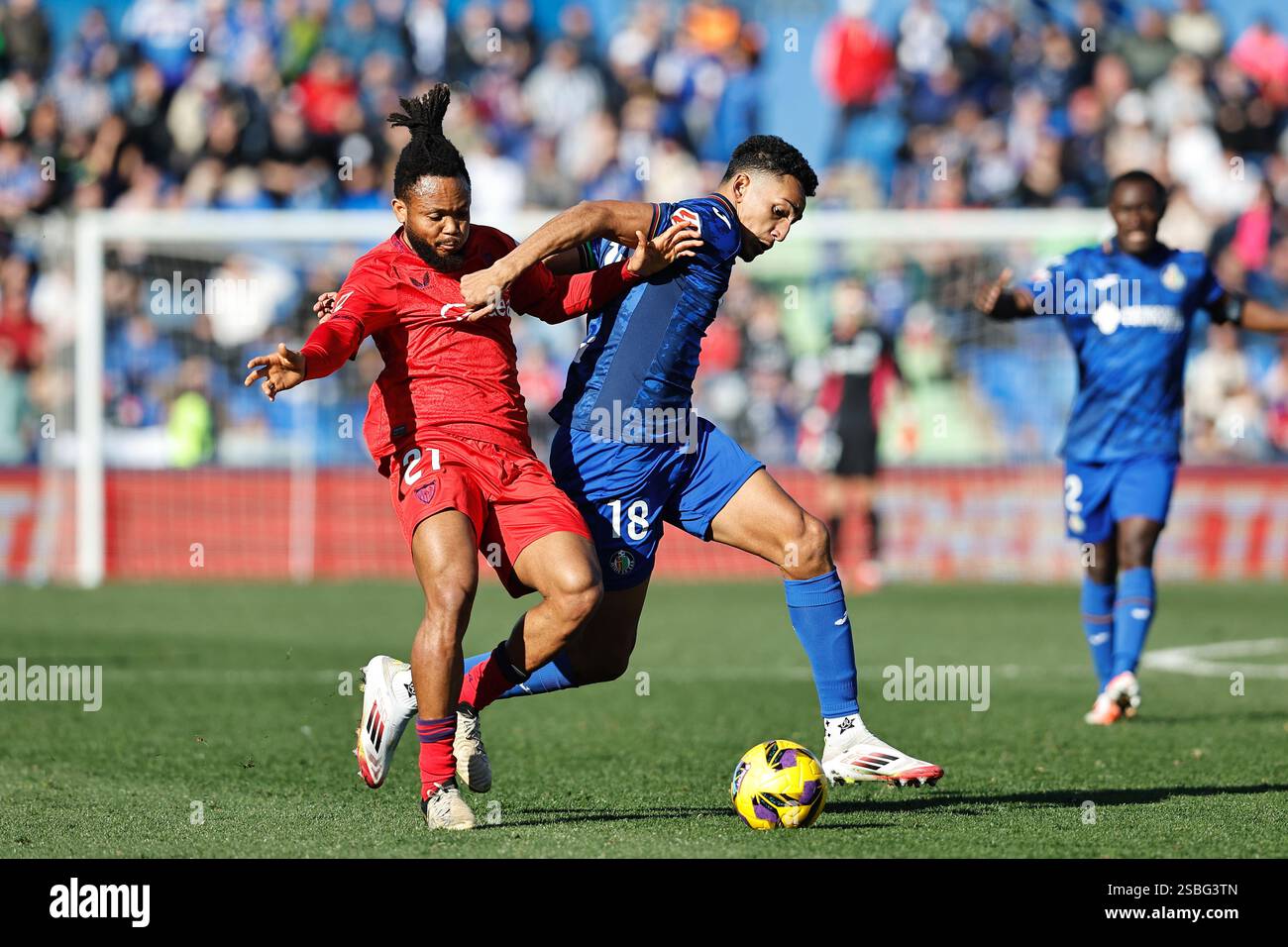 Getafe, Spain. 1st Feb, 2025. (L-R) Chidera Ejuke (Sevilla), Alvaro ...