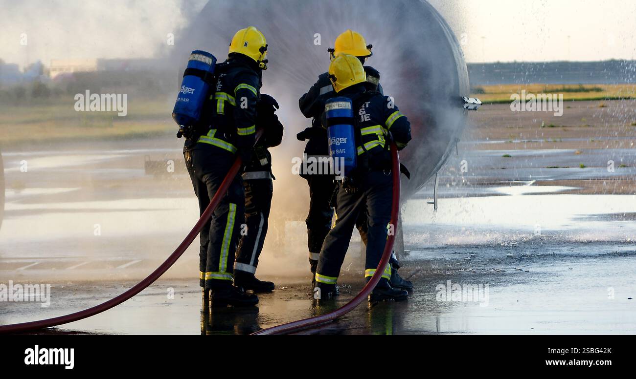 Aircraft engine fire at airport, airport emergency Stock Photo - Alamy