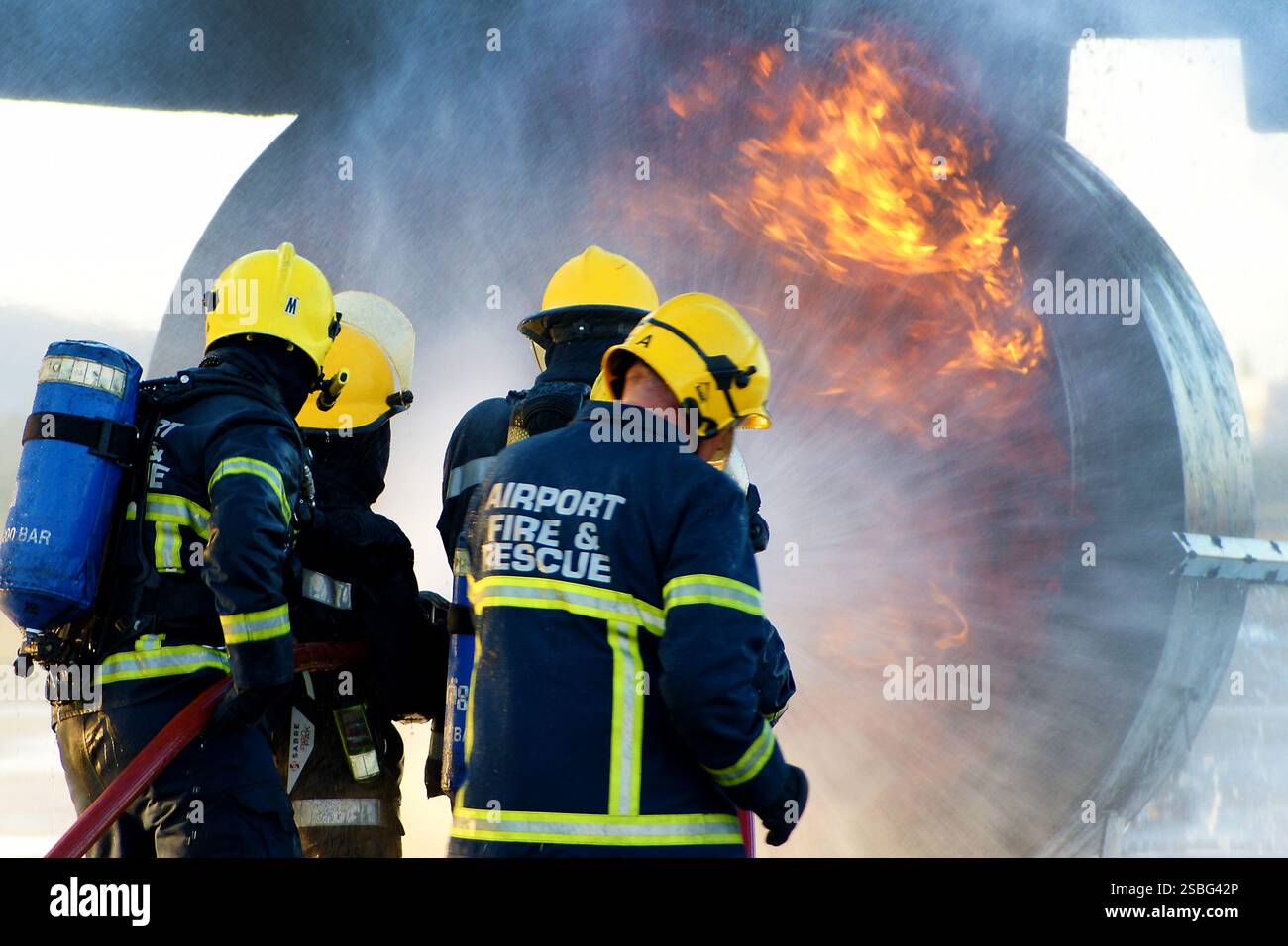 Aircraft engine fire at airport, airport emergency Stock Photo - Alamy