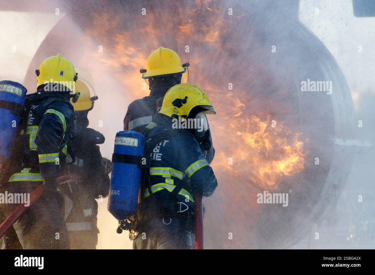 Aircraft engine fire at airport, airport emergency Stock Photo - Alamy
