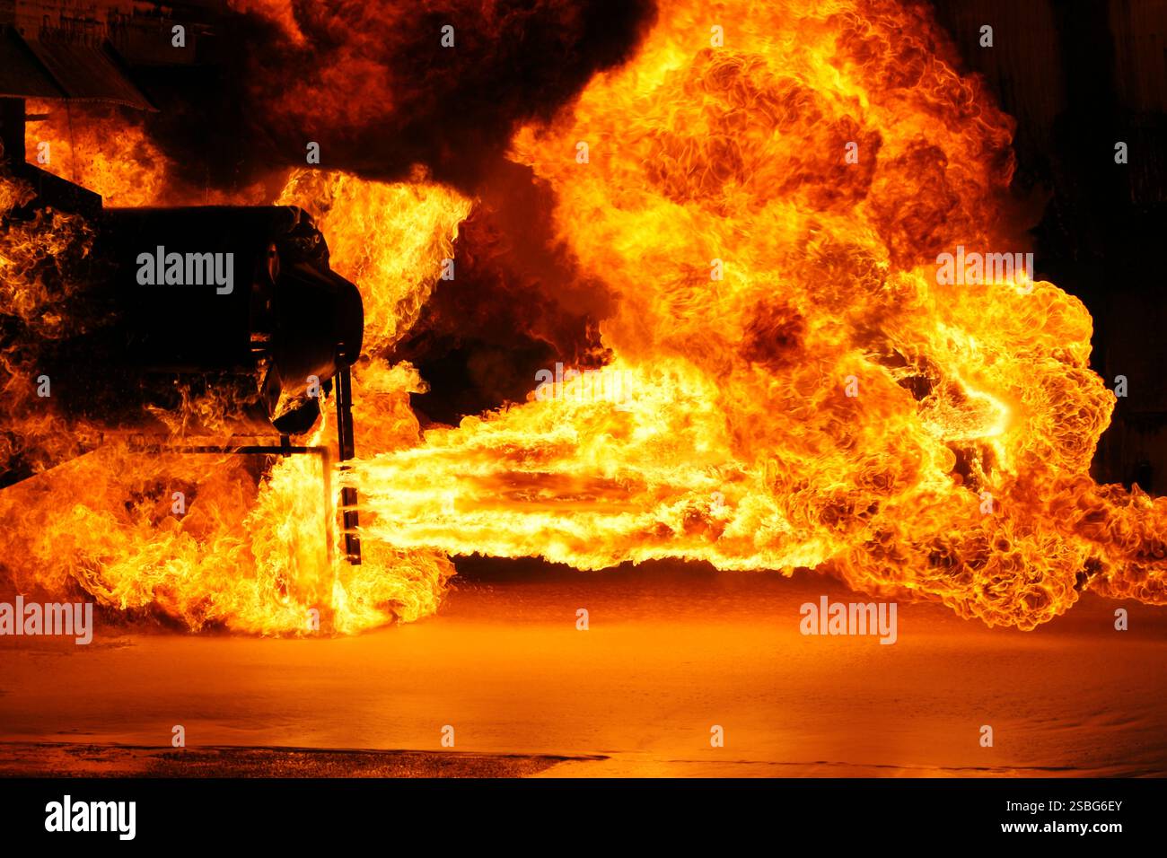 Aircraft engine fire at airport, airport emergency Stock Photo - Alamy