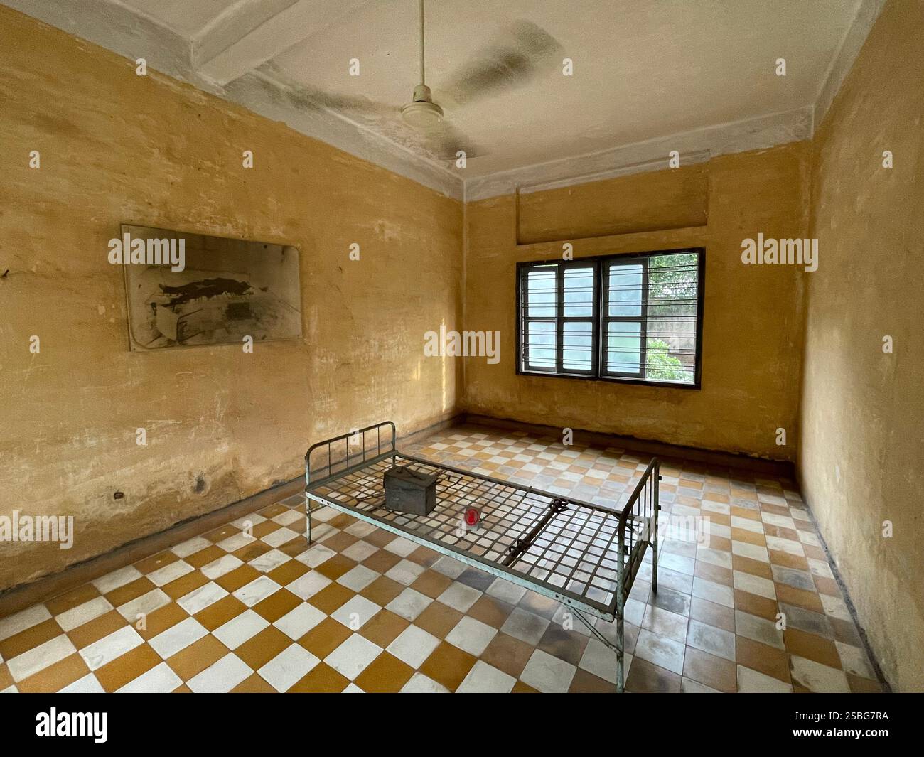 A cell at Tuol Sleng Genocide Museum in Phnom Penh . It is a former ...