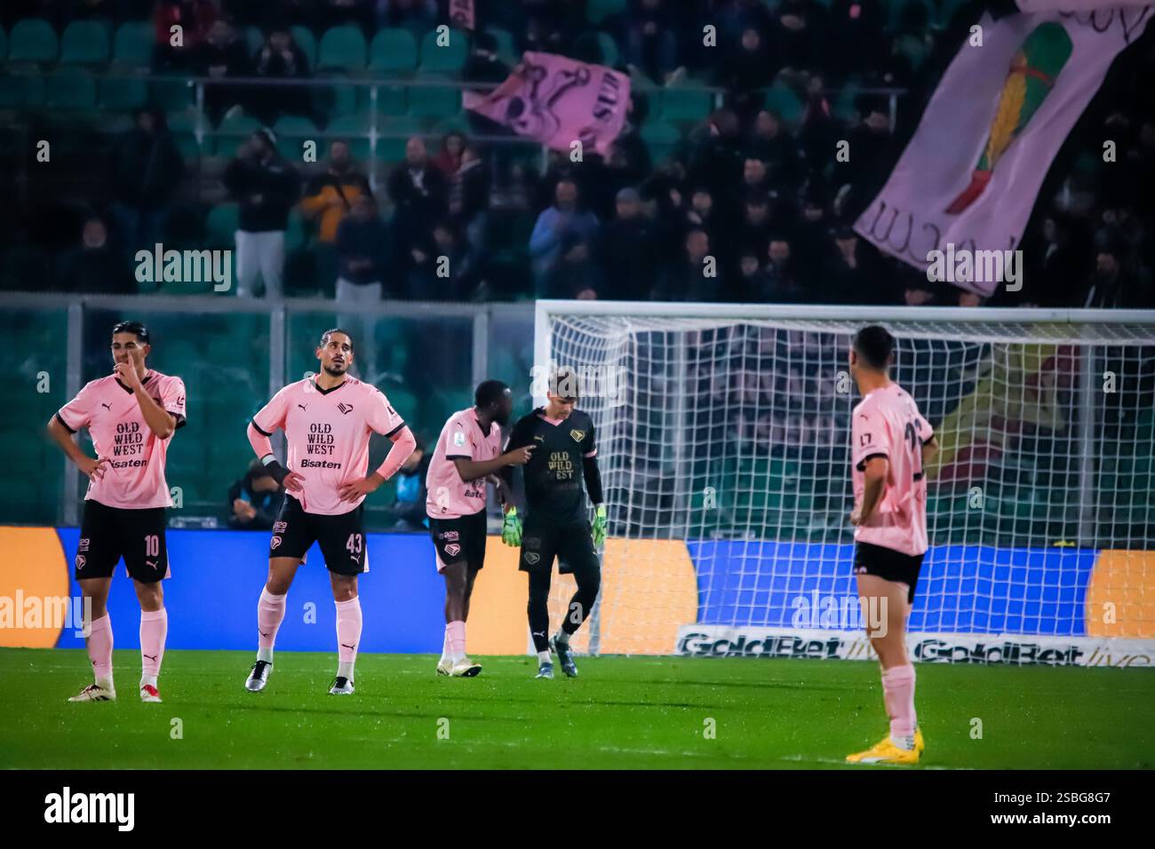 Palermo, Italy. 31st Jan, 2025. Palermo's players console a goalkeeper ...
