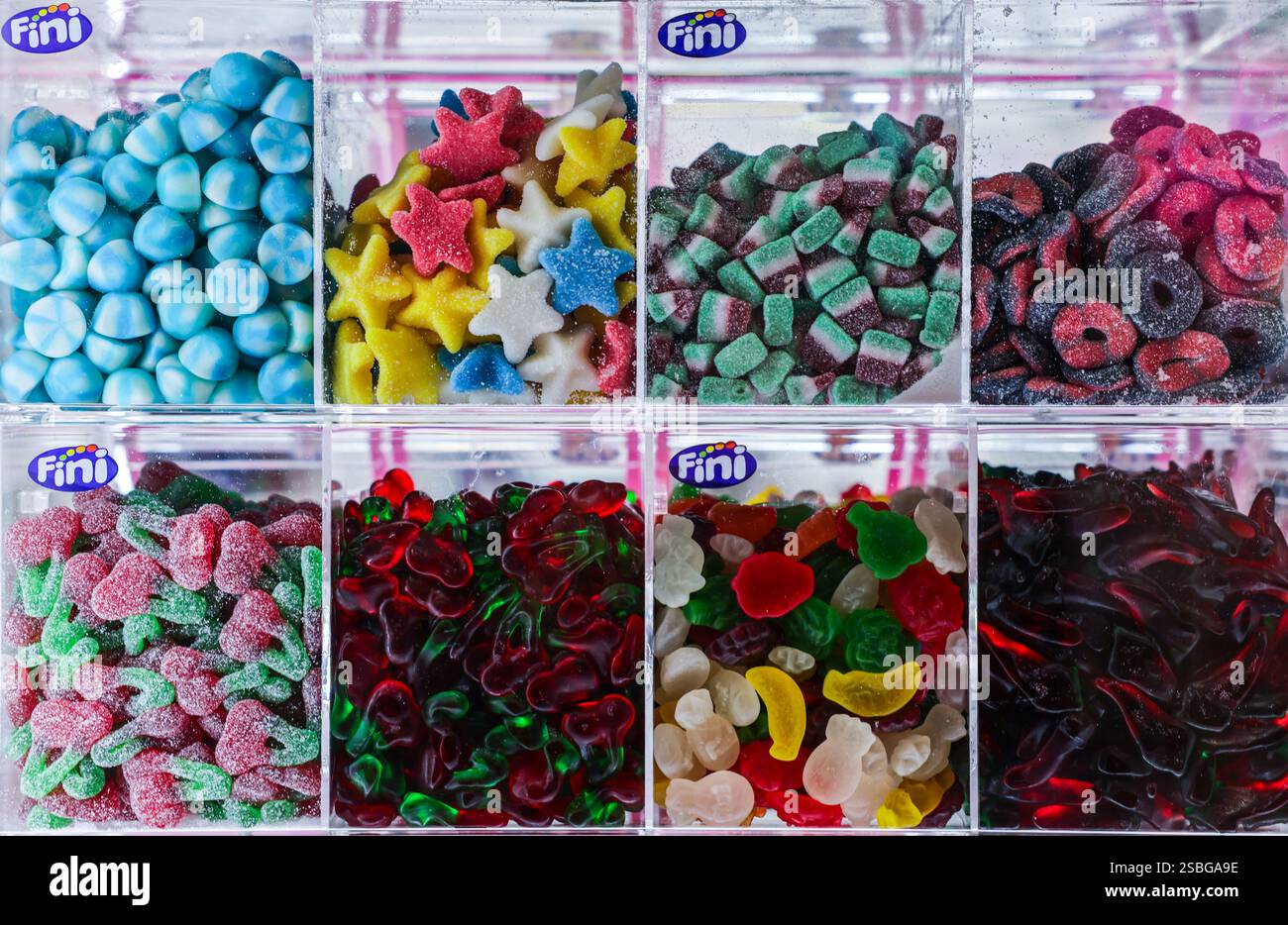 Cologne, Germany. 03rd Feb, 2025. Colored fruit gums lie in containers ...