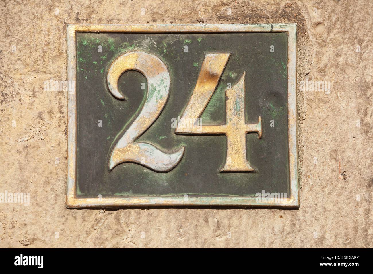 House license plate number 24 on brown house wall, Germany Stock Photo ...