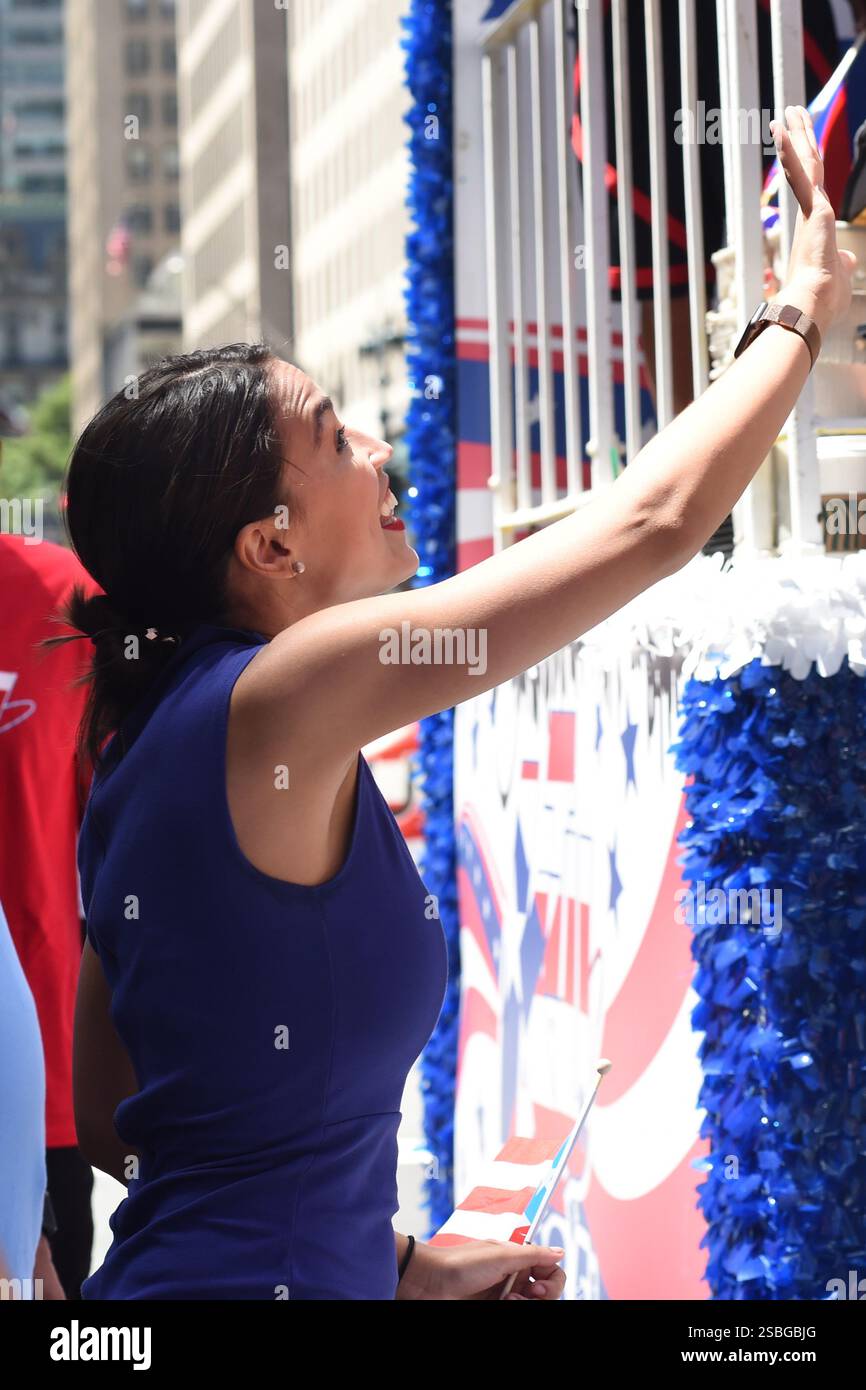 Alexandria Ocasio-Cortez marching in the National Puerto Rican Day ...