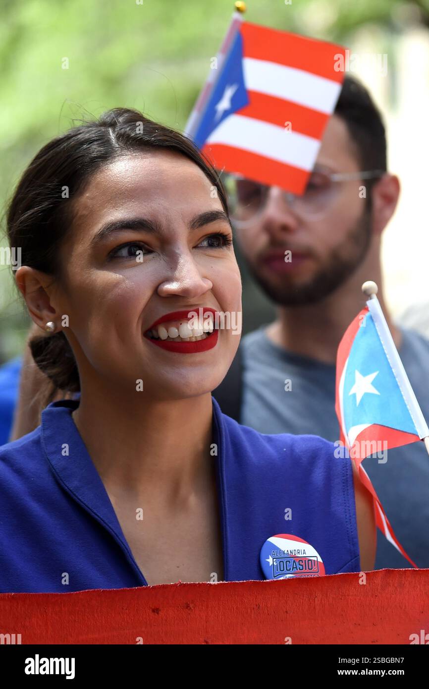 Alexandria Ocasio-Cortez marching in the National Puerto Rican Day ...