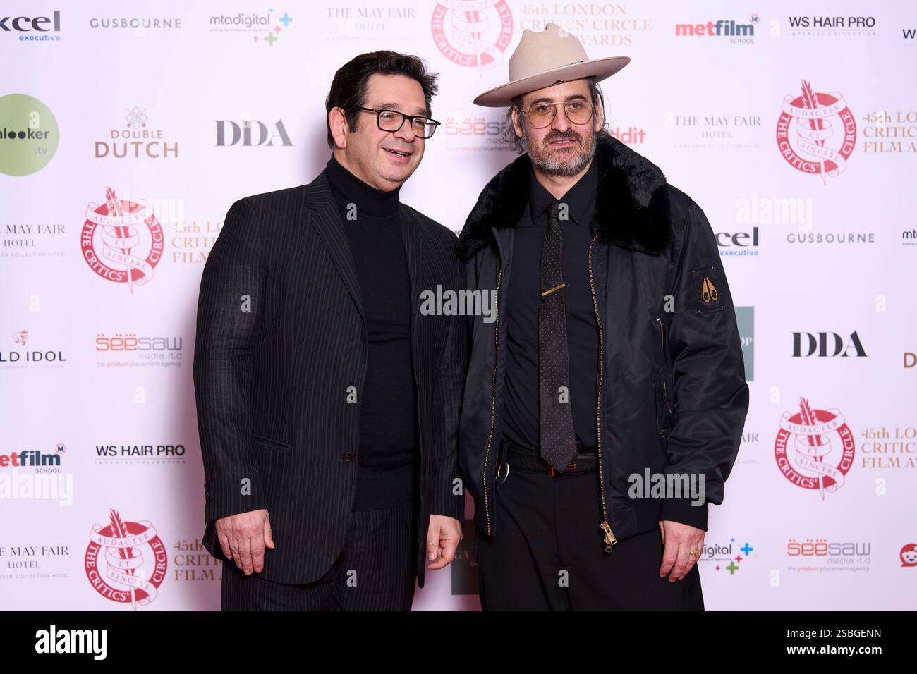 Ian Bonhote, left, and Peter Ettedgui pose for photographers upon arrival at the 45th London ...