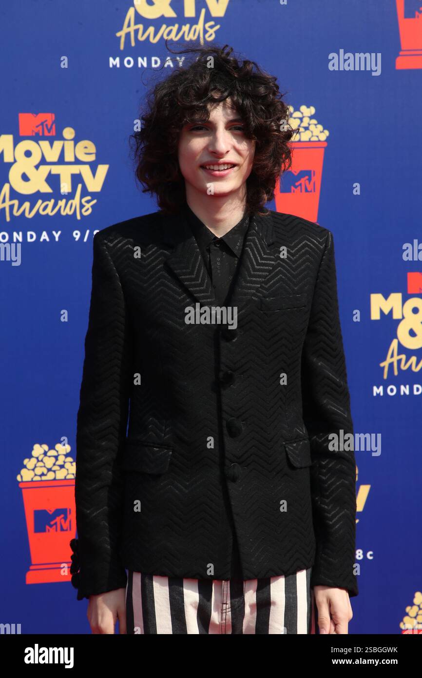Finn Wolfhard at the MTV Movie & TV Awards, Arrivals, Barker Hangar ...