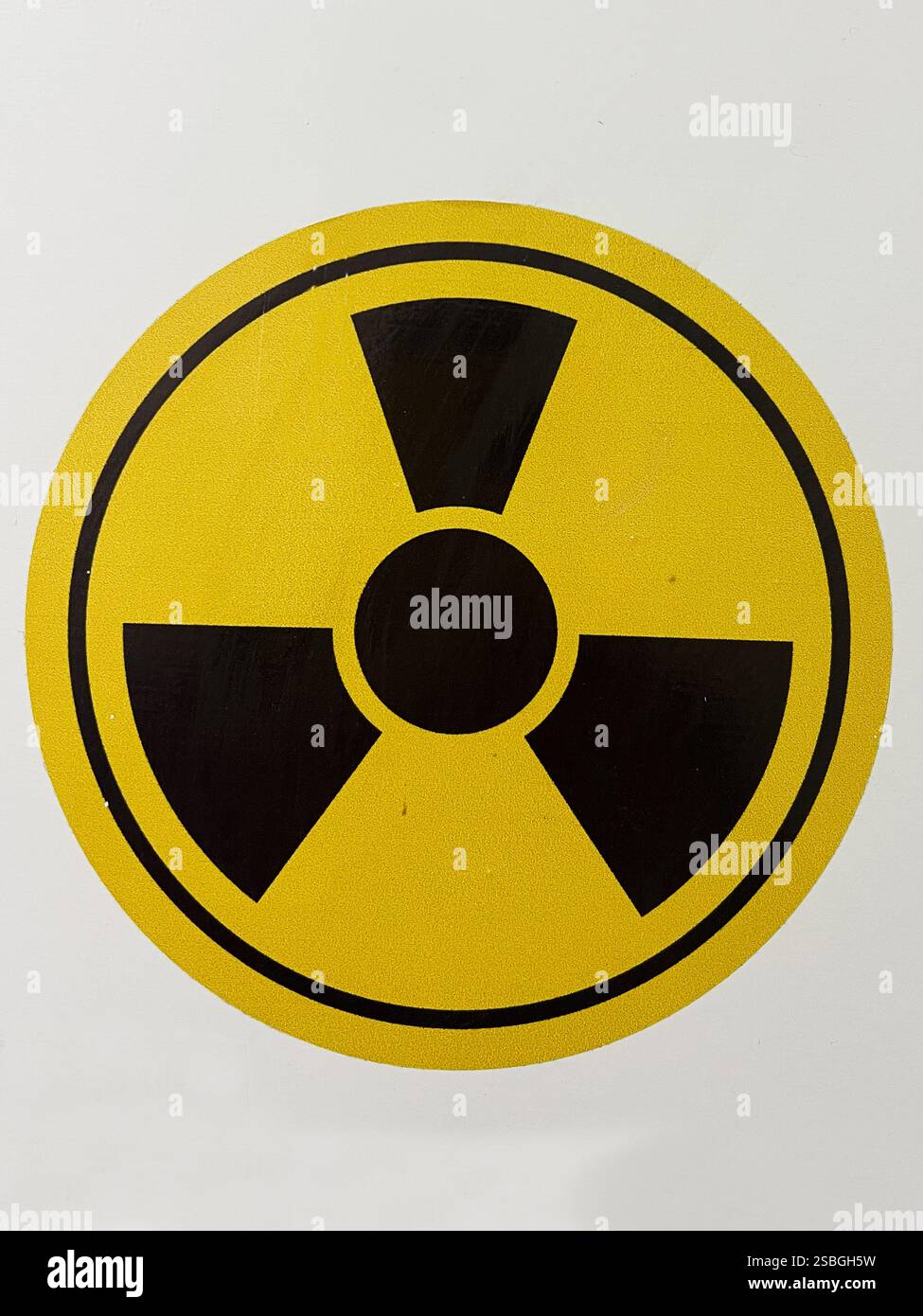 Yellow and black radiation hazard symbol indicating the presence of ...