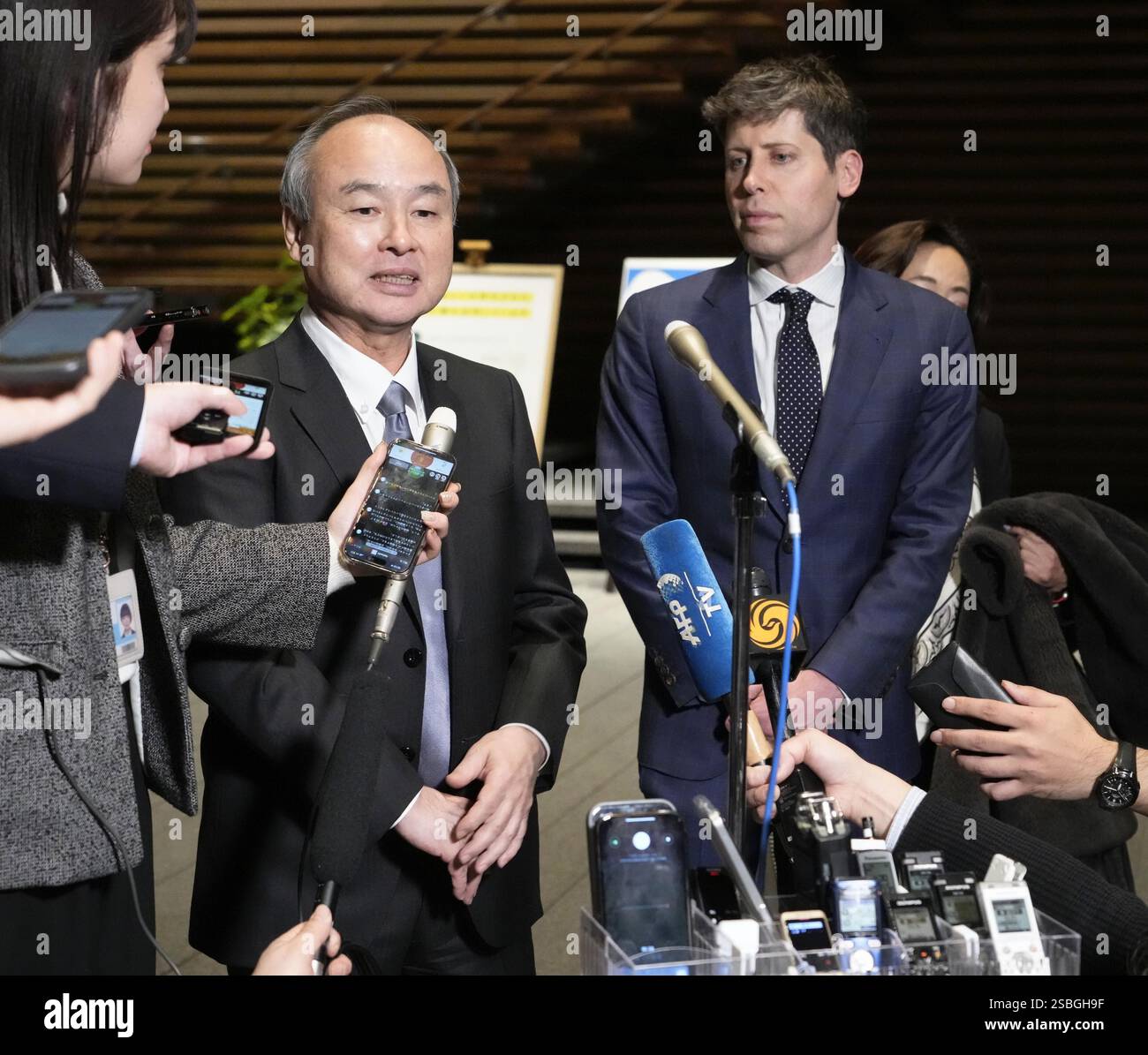 SoftBank Group CEO Masayoshi Son (L) and OpenAI CEO Sam Altman meet ...