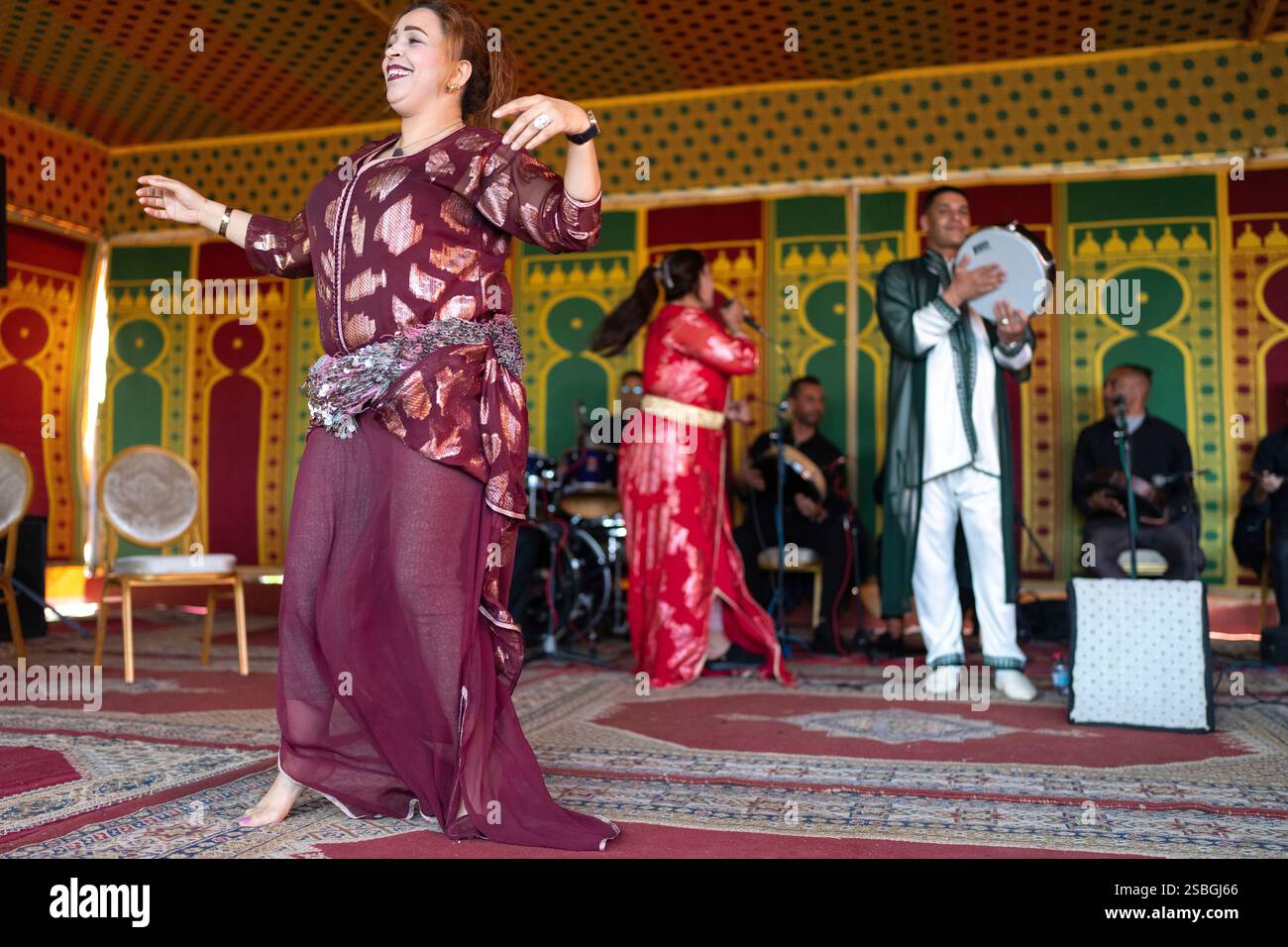 A woman dances during a traditional performance known as Aita, in Sidi ...