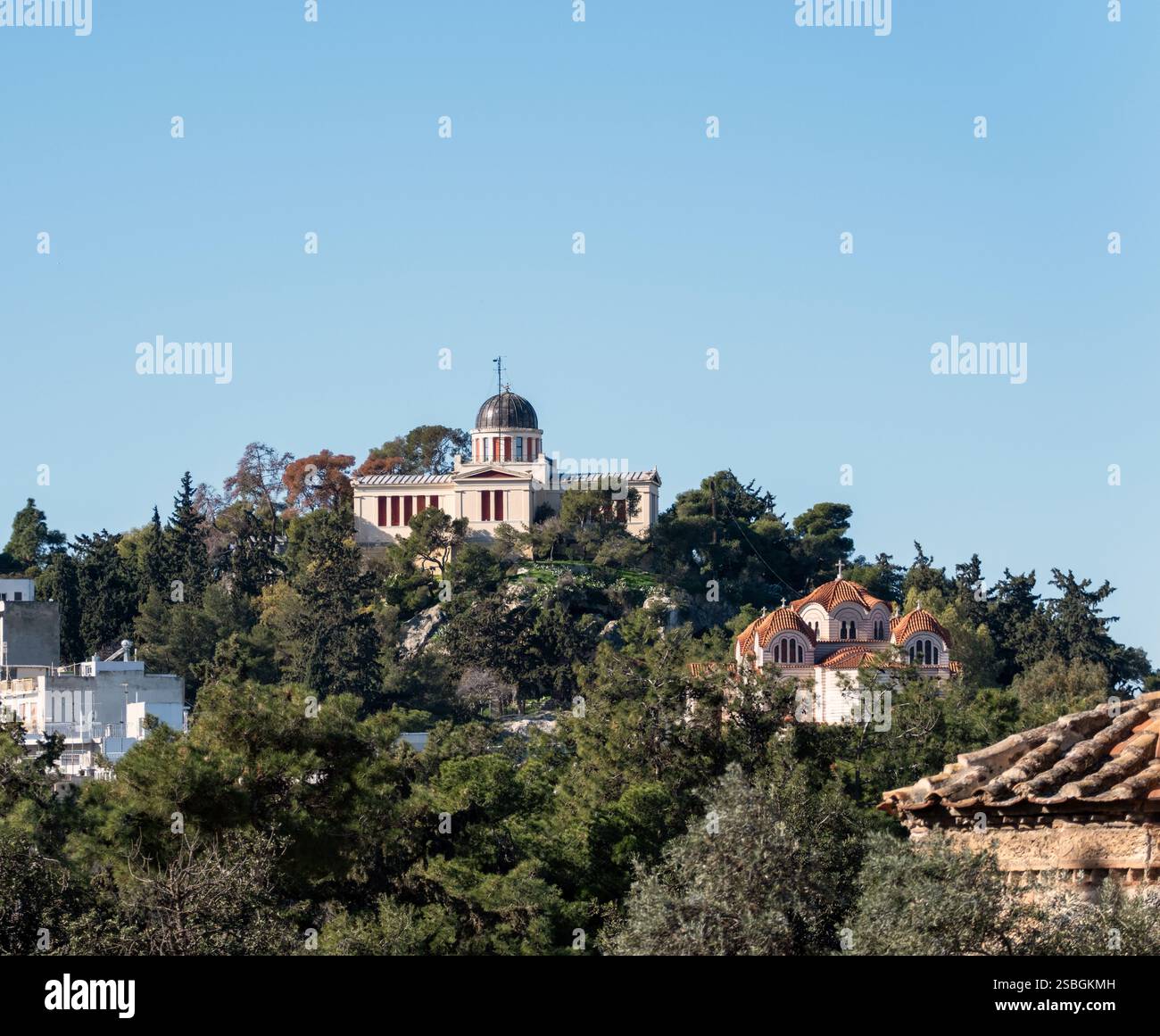 Athens, Greece. National observatory building up on the hill, blue sky ...