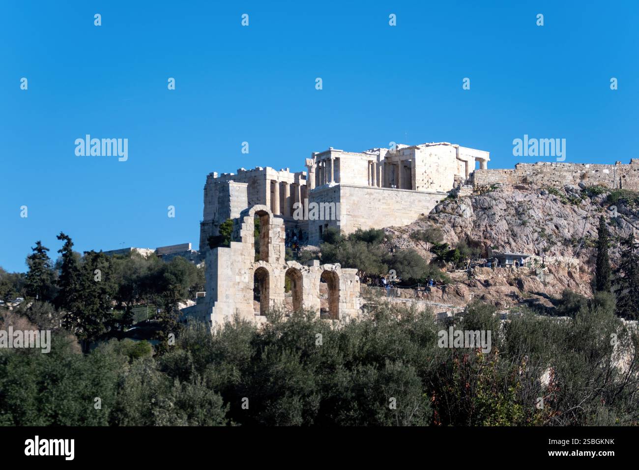 Athens, Greece. Acropolis propylaea gate and Herodeion remains, view ...